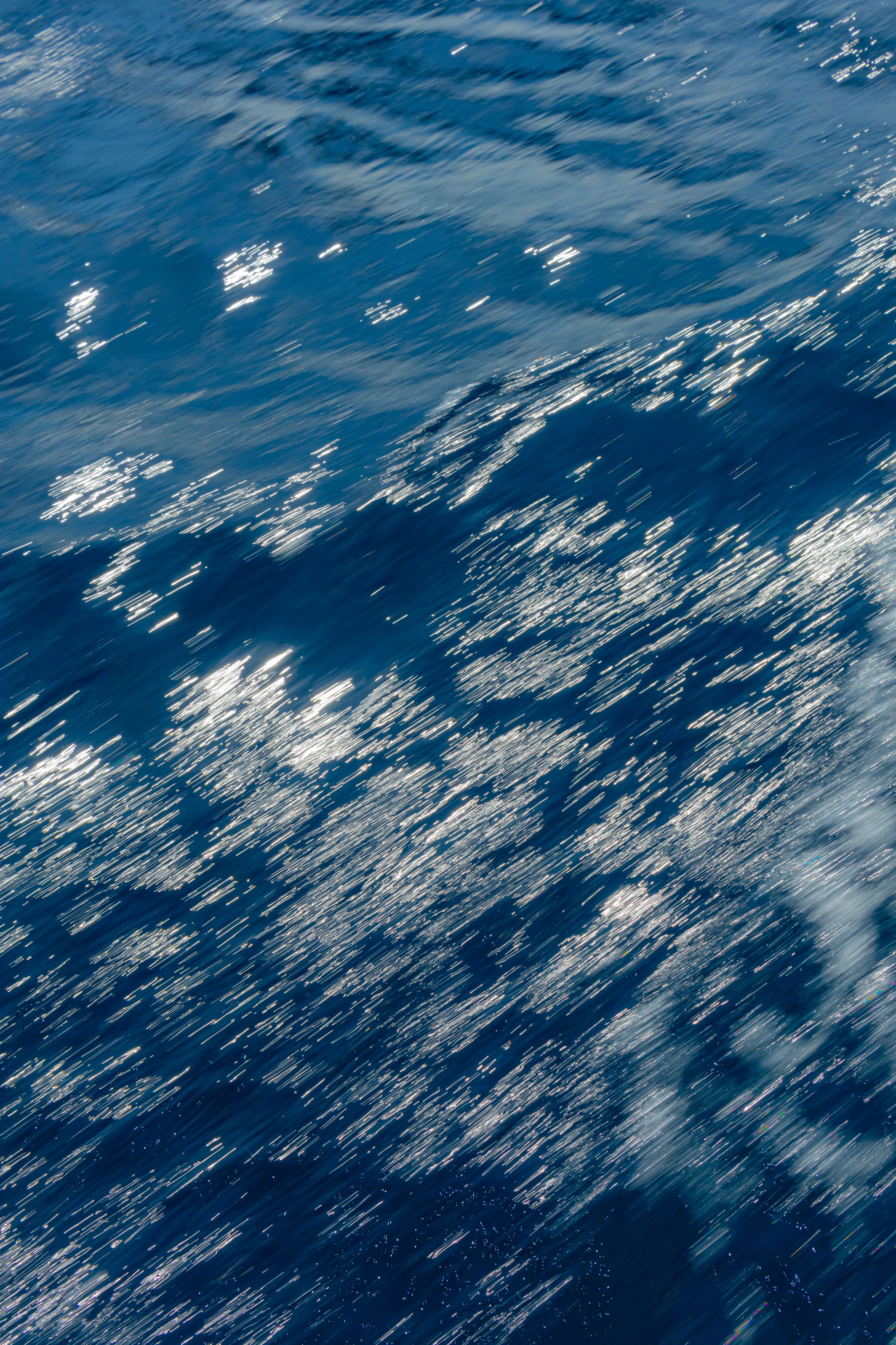 A close up of the ocean surface with waves · Free Stock Photo