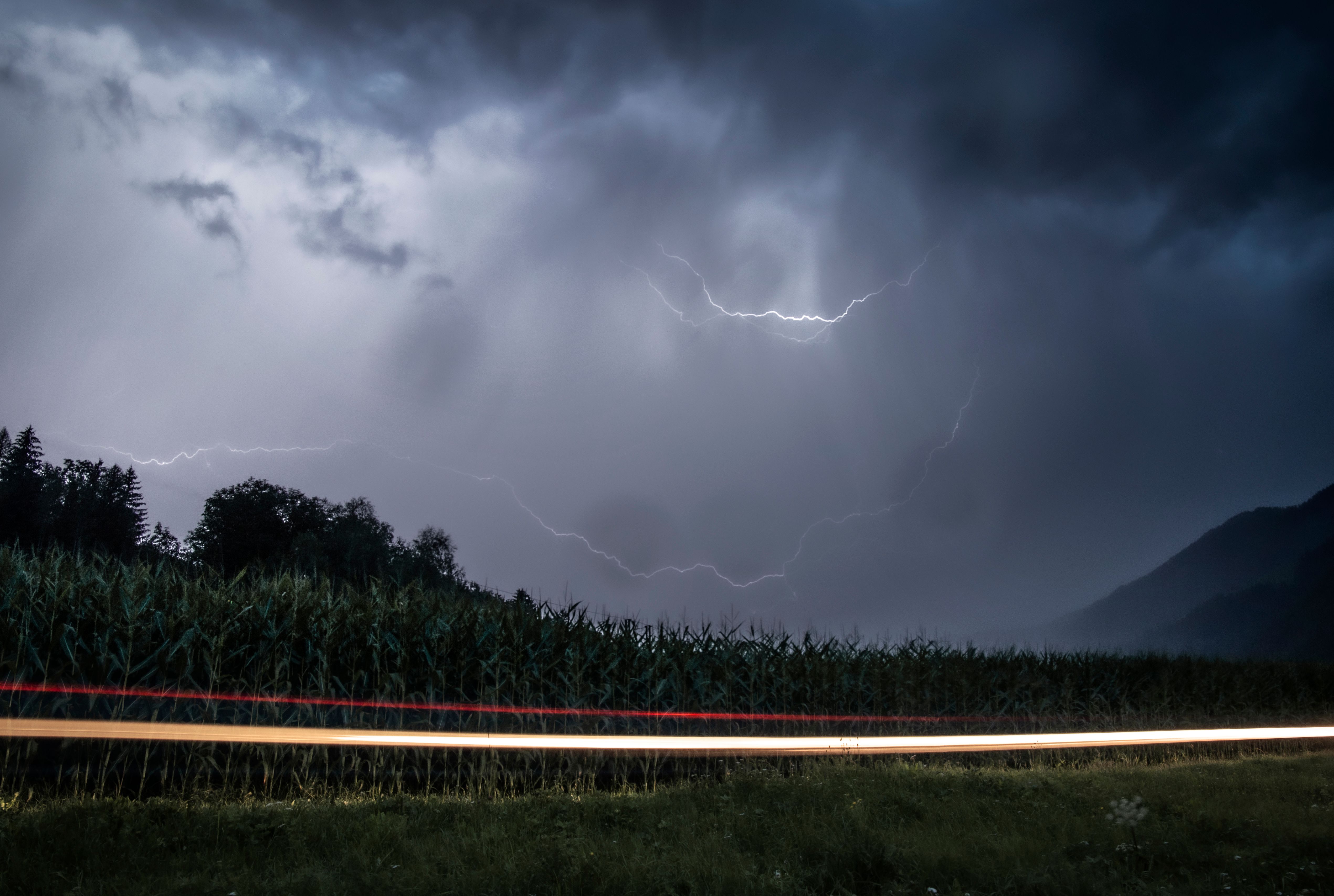 Long Exposure Footage of Road Lights, and a Thunderstorm · Free Stock Photo