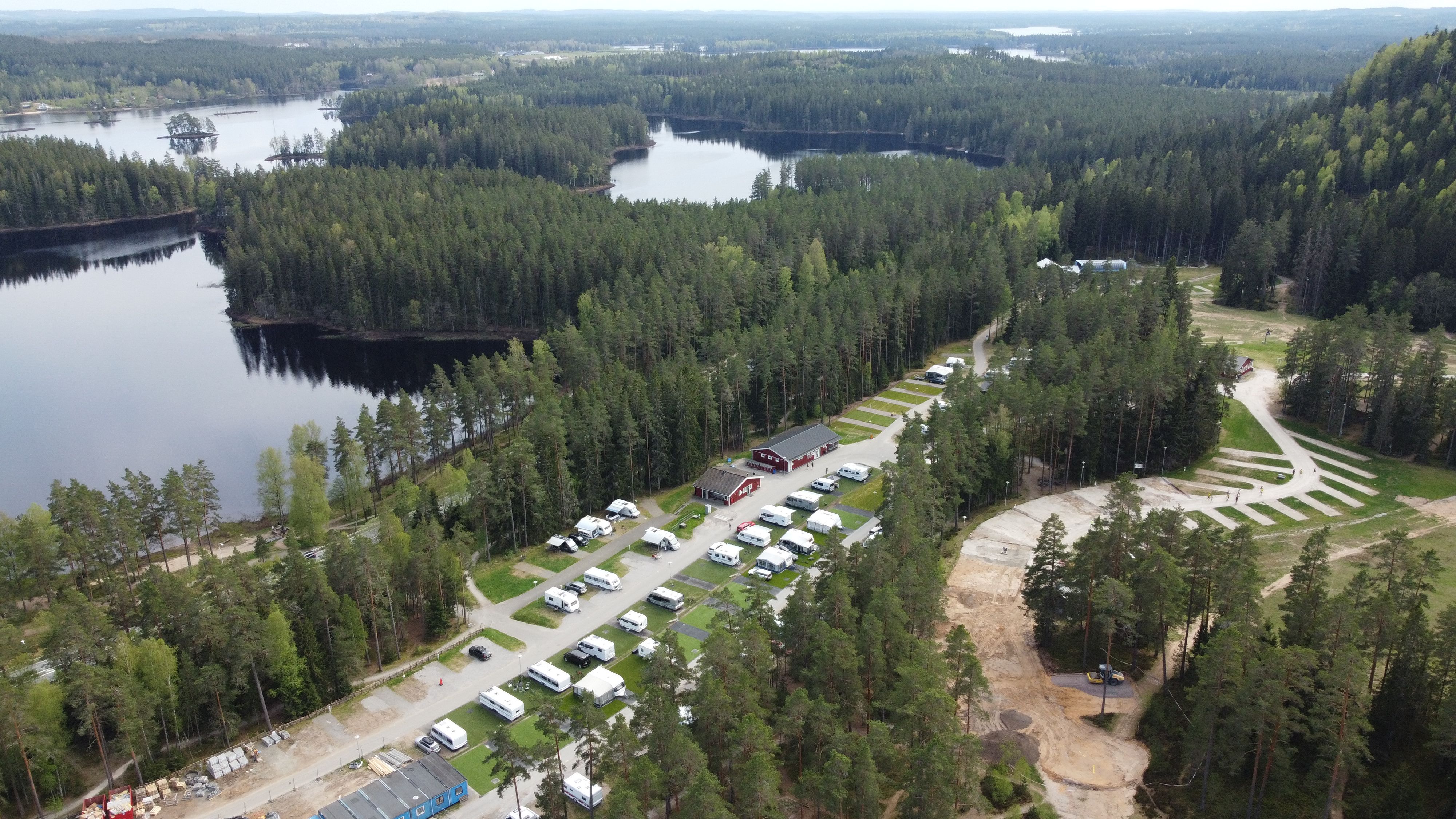 Aerial View of a Campsite Surrounded by Lakes · Free Stock Photo