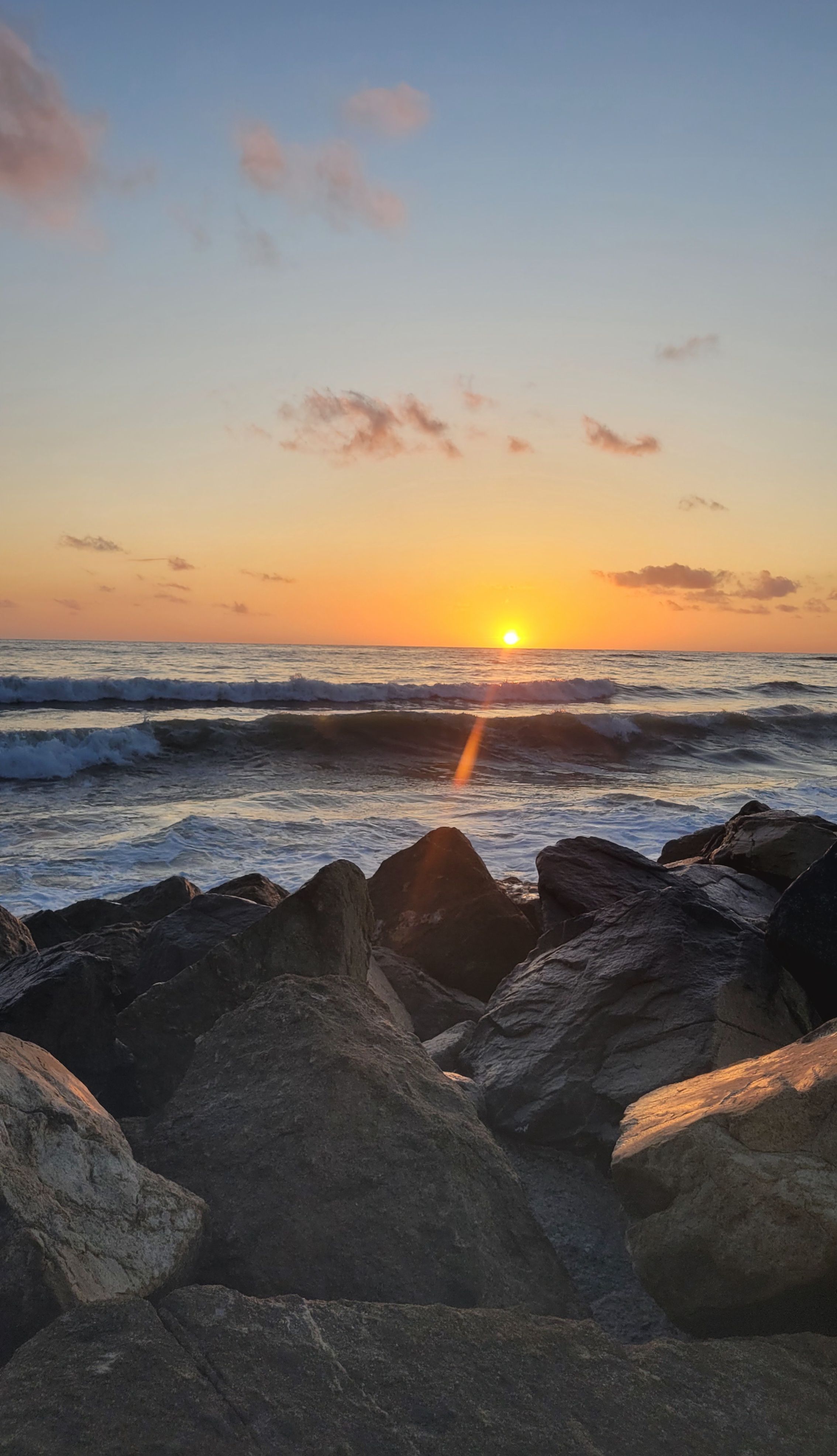 Stones Surrounded by Body of Water during Sunset · Free Stock Photo