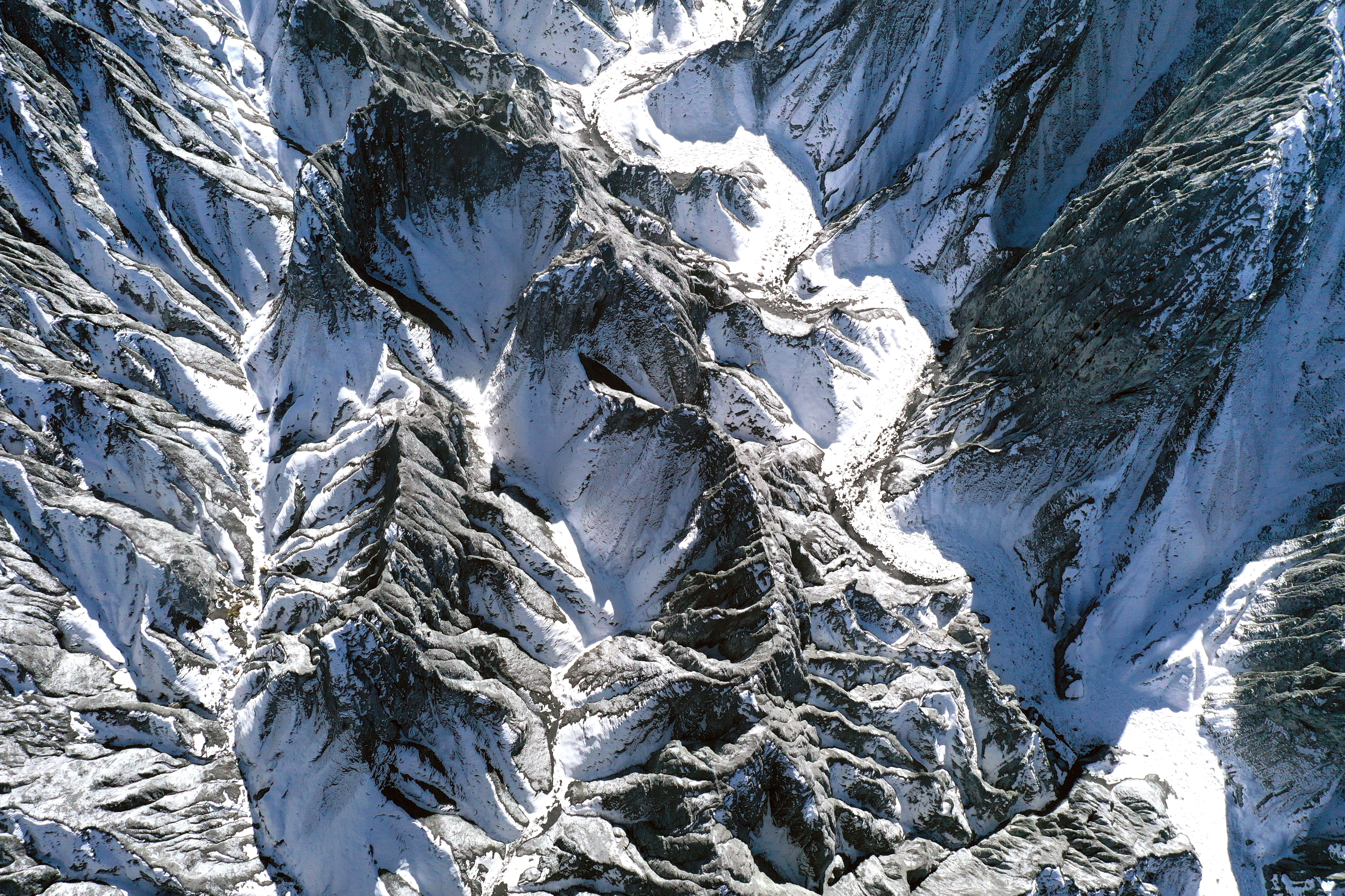 Texture of Rocky Mountains in Snow · Free Stock Photo