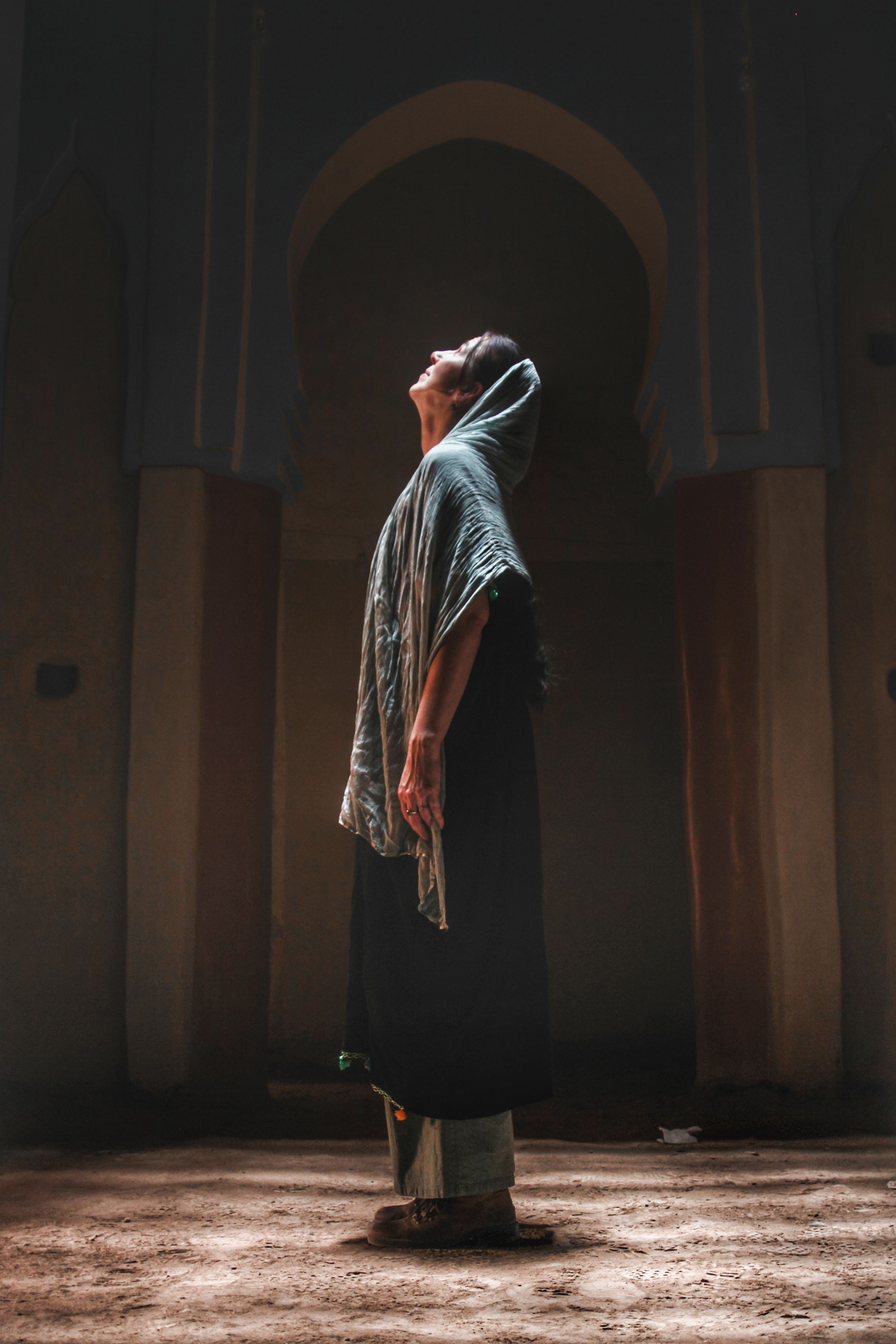 Photo of a Woman Wearing a Headscarf, Standing in a Monastery · Free ...
