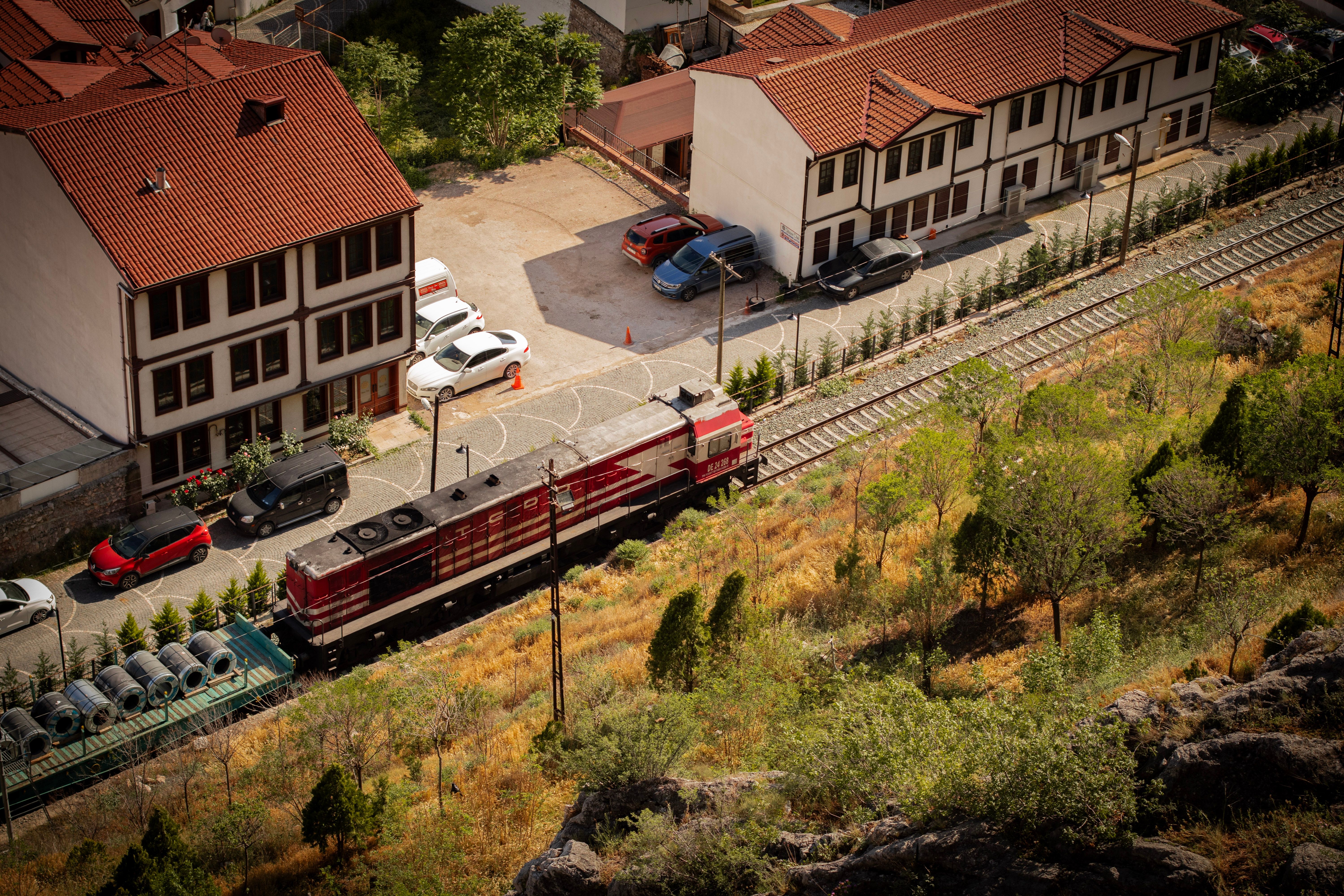 Train near Houses in Town · Free Stock Photo