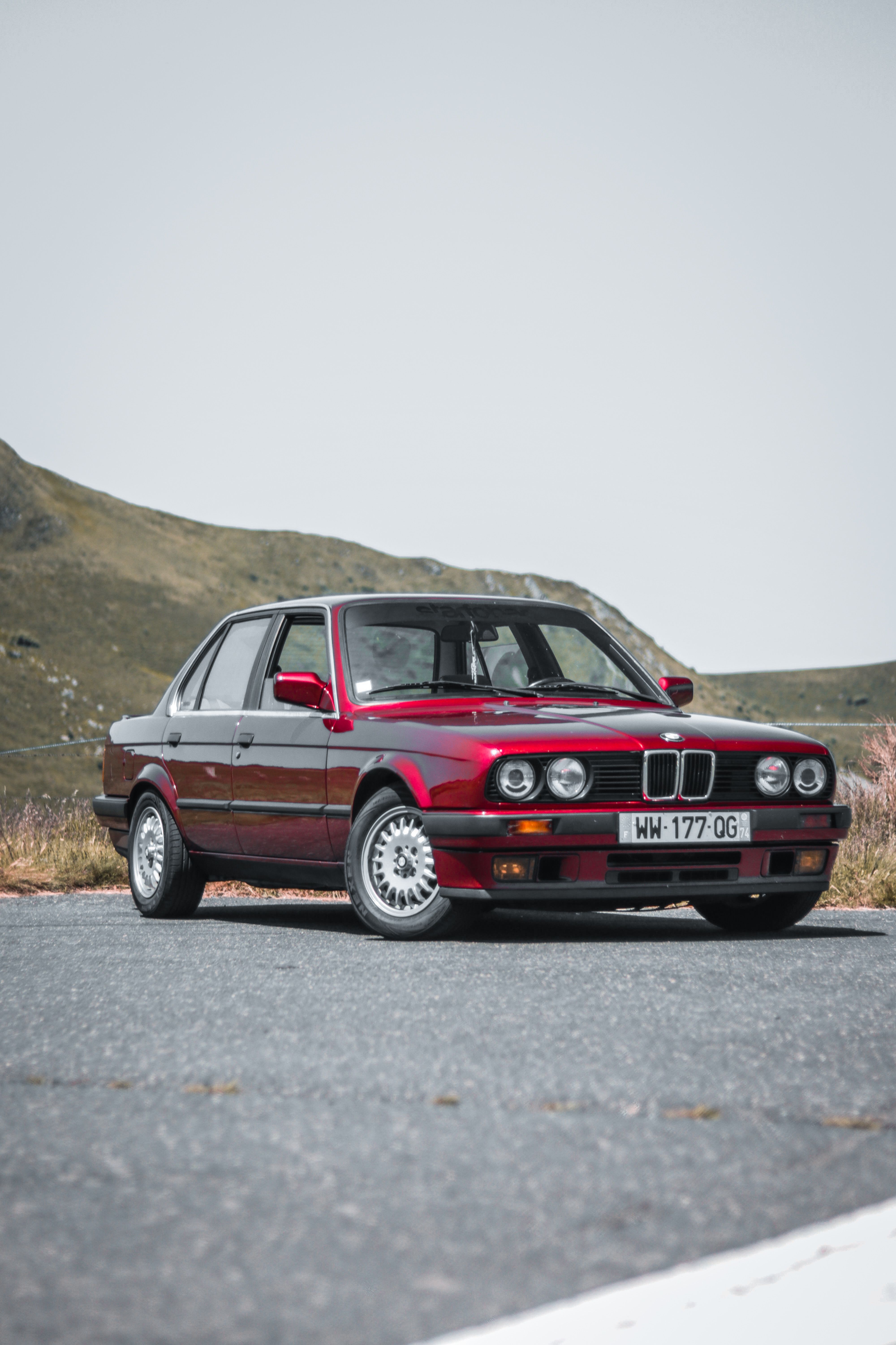 Red BMW 325i on Parking Lot · Free Stock Photo
