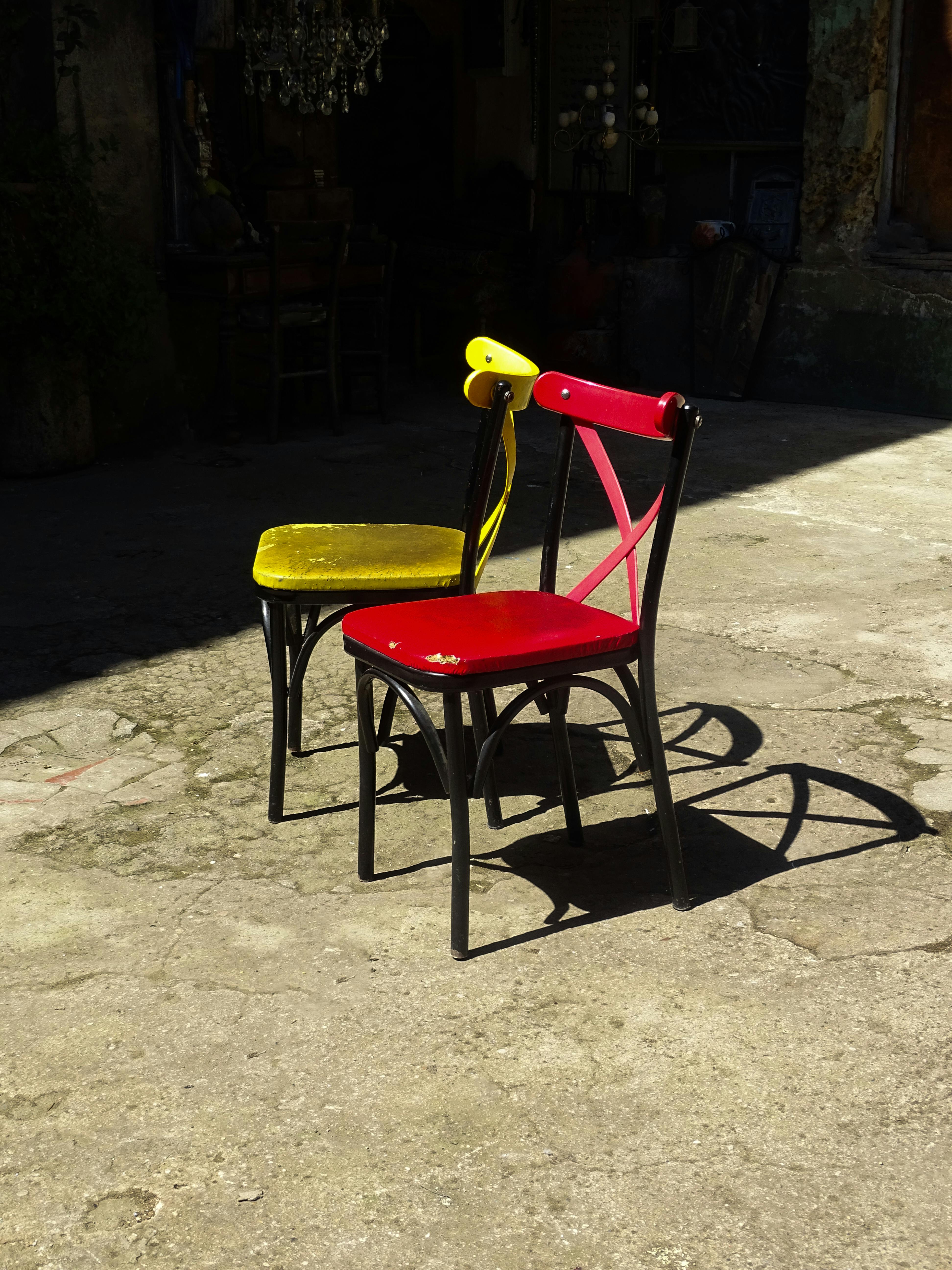 Bright Chairs Illuminated by Sunlight · Free Stock Photo
