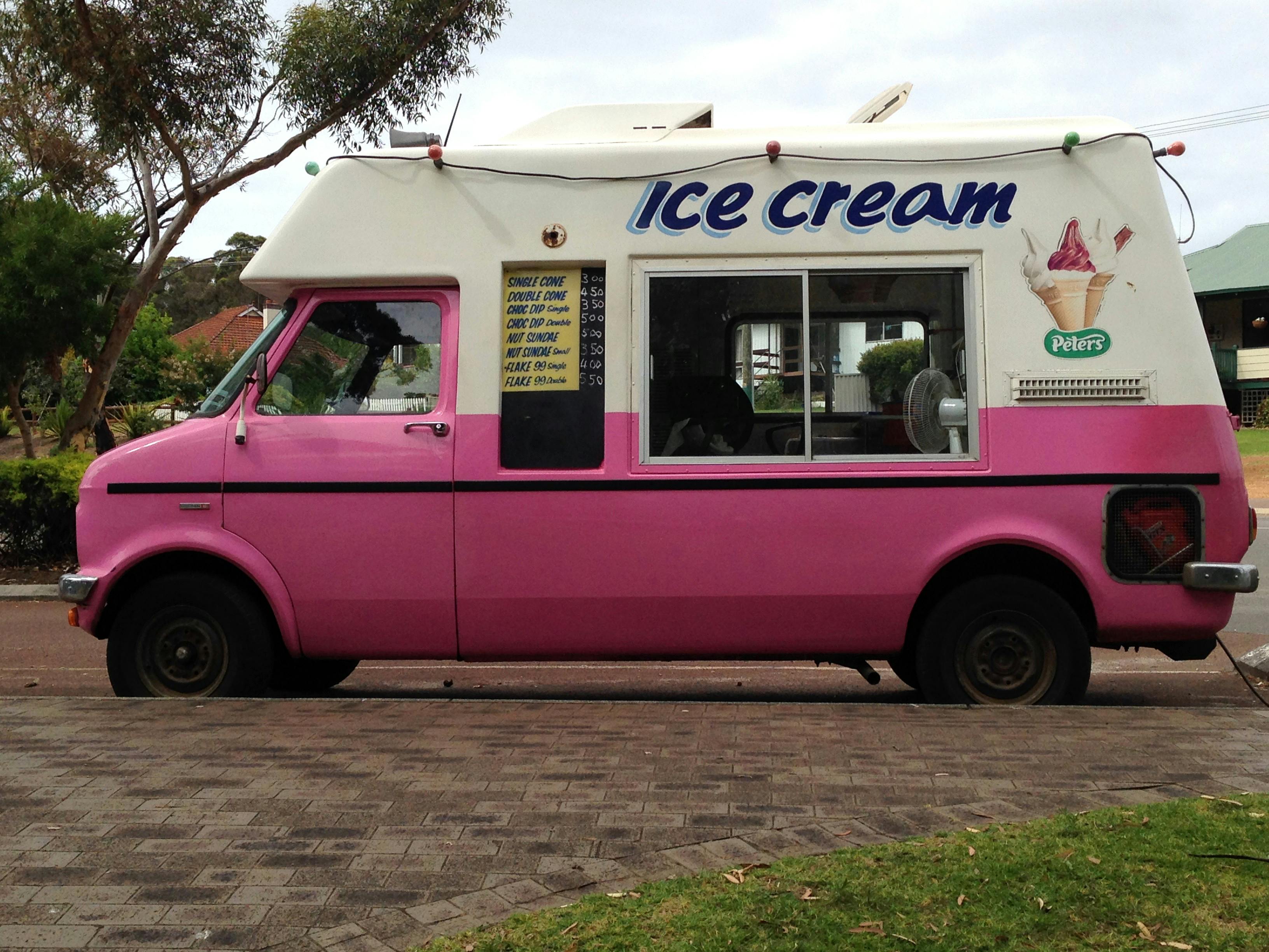 Pink Ice Cream Truck on a Pavement · Free Stock Photo