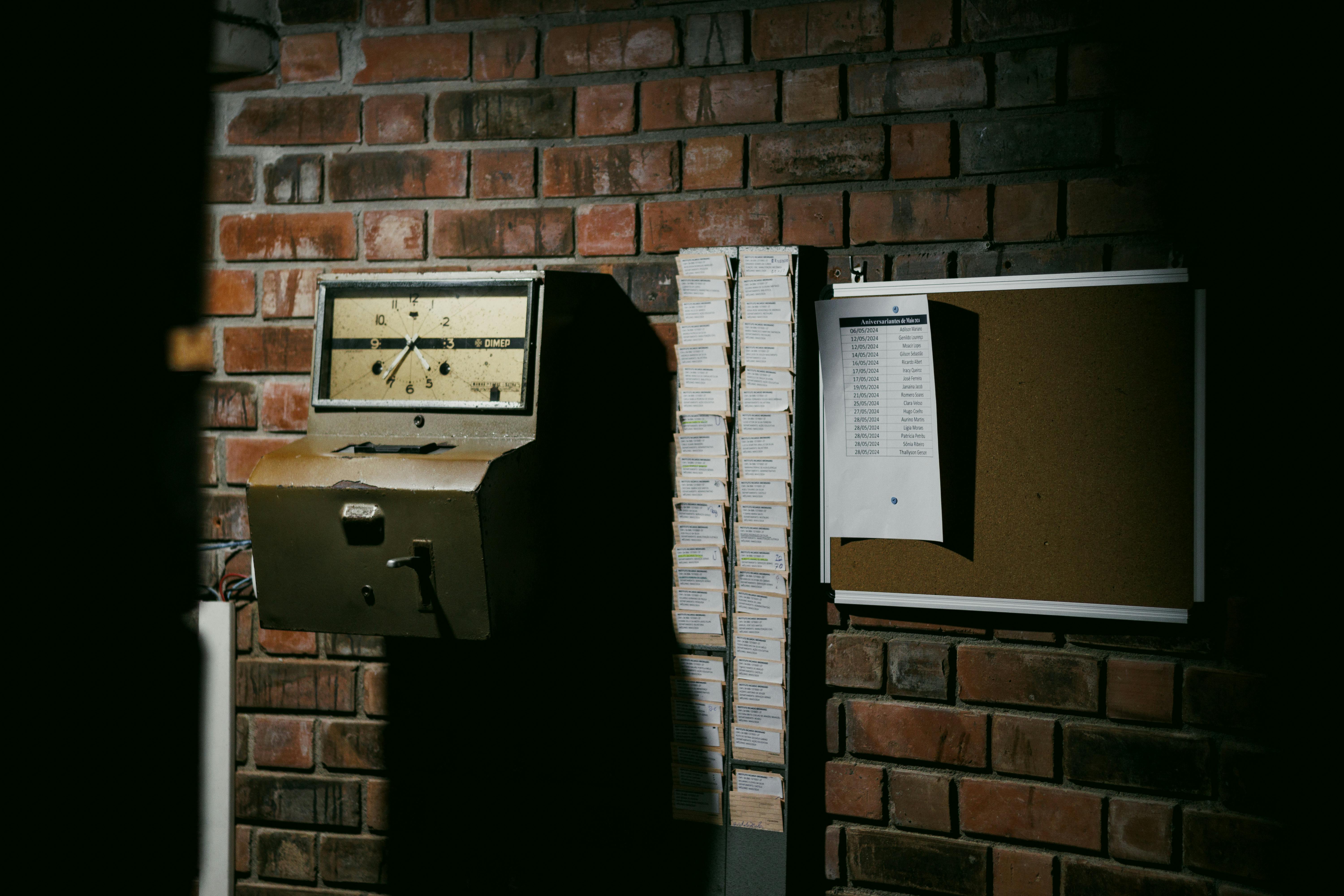 Old Clock Machine and Punch Cards at the Factory Entrance · Free Stock ...