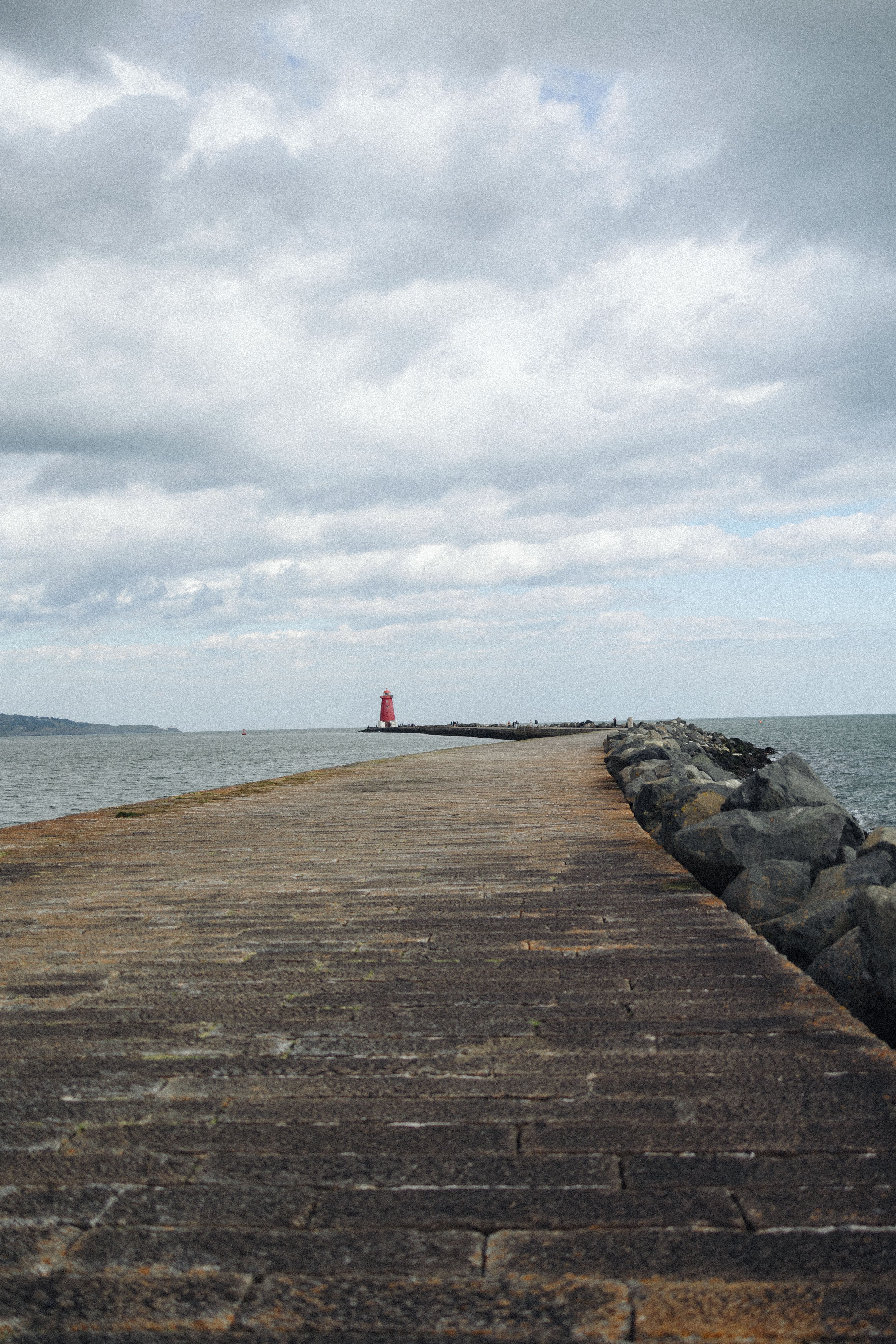 Red Lighthouse by the Shore · Free Stock Photo