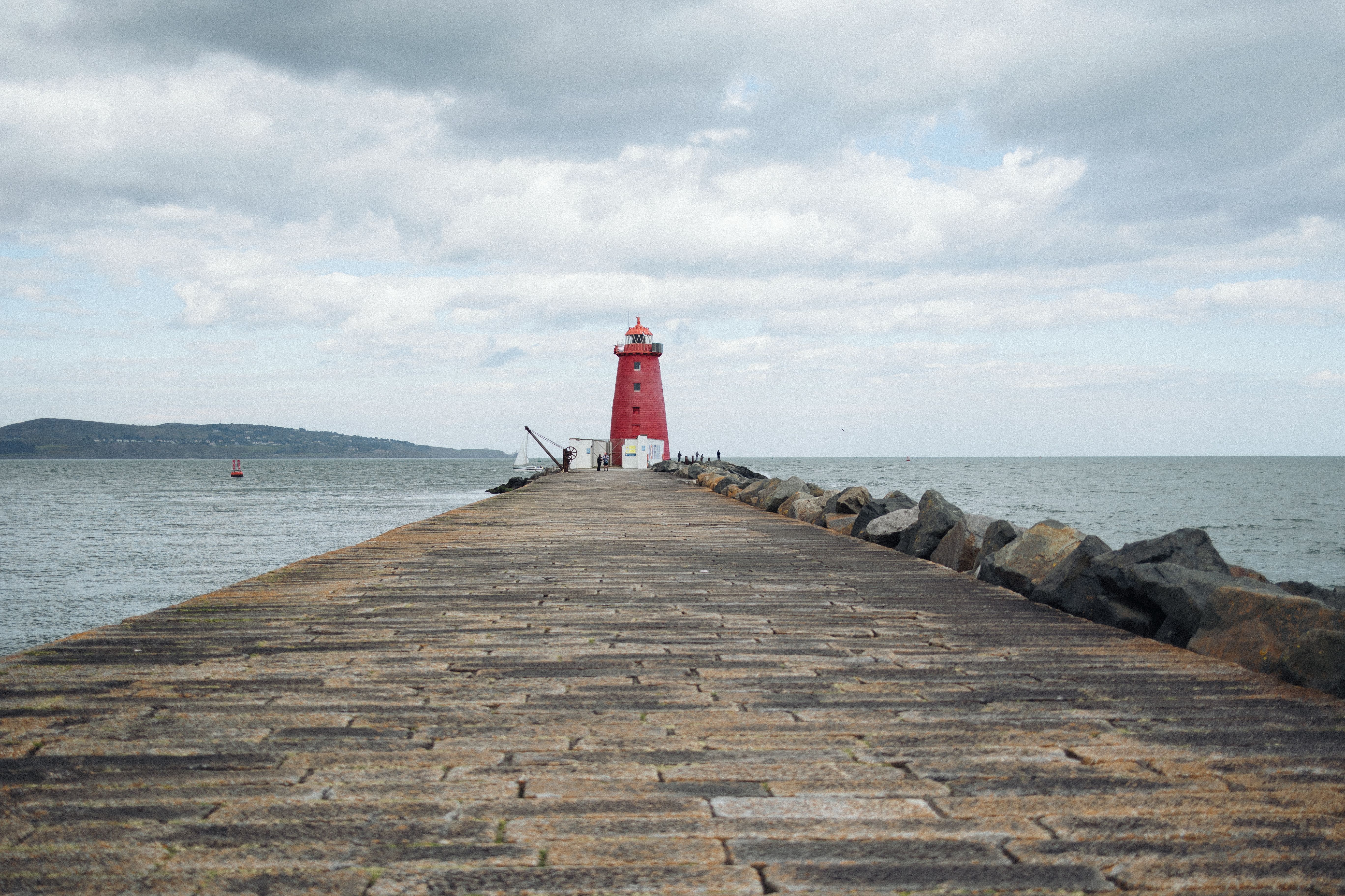 Red Lighthouse at the End of Pier · Free Stock Photo