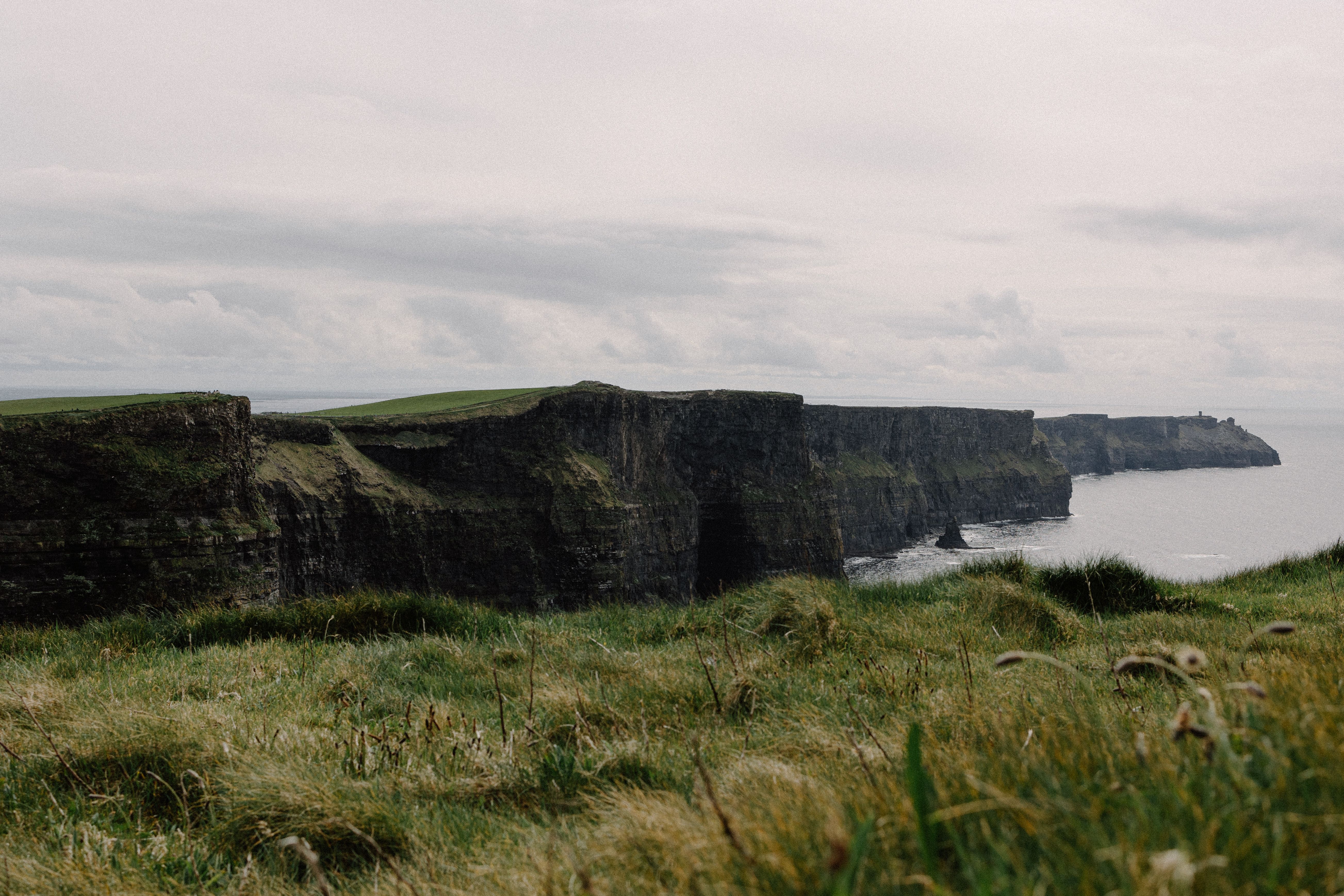 Rocky Cliffs by the Shore · Free Stock Photo