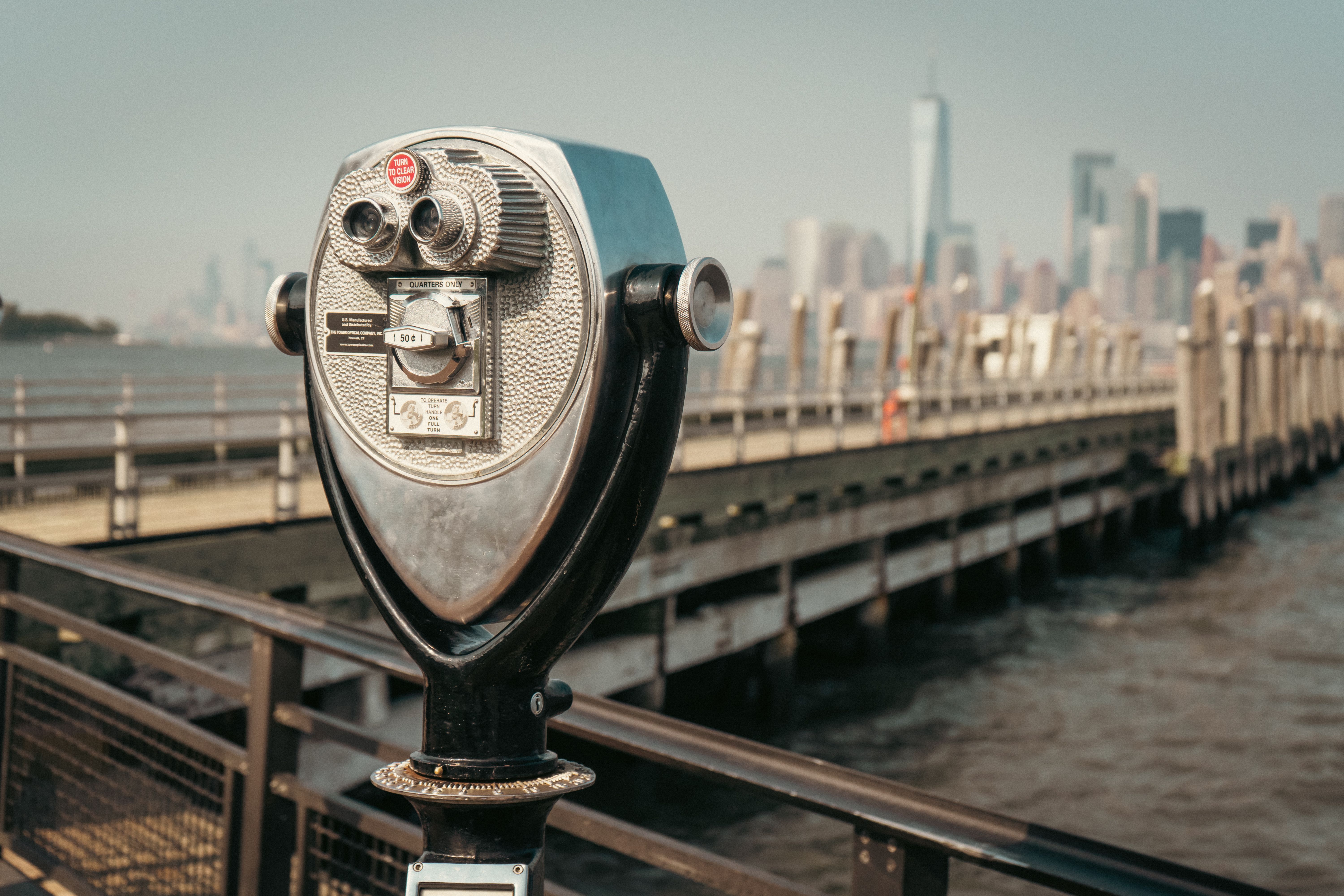 A Coin Operated Binoculars at a Pier with Manhattan Skyline in the ...