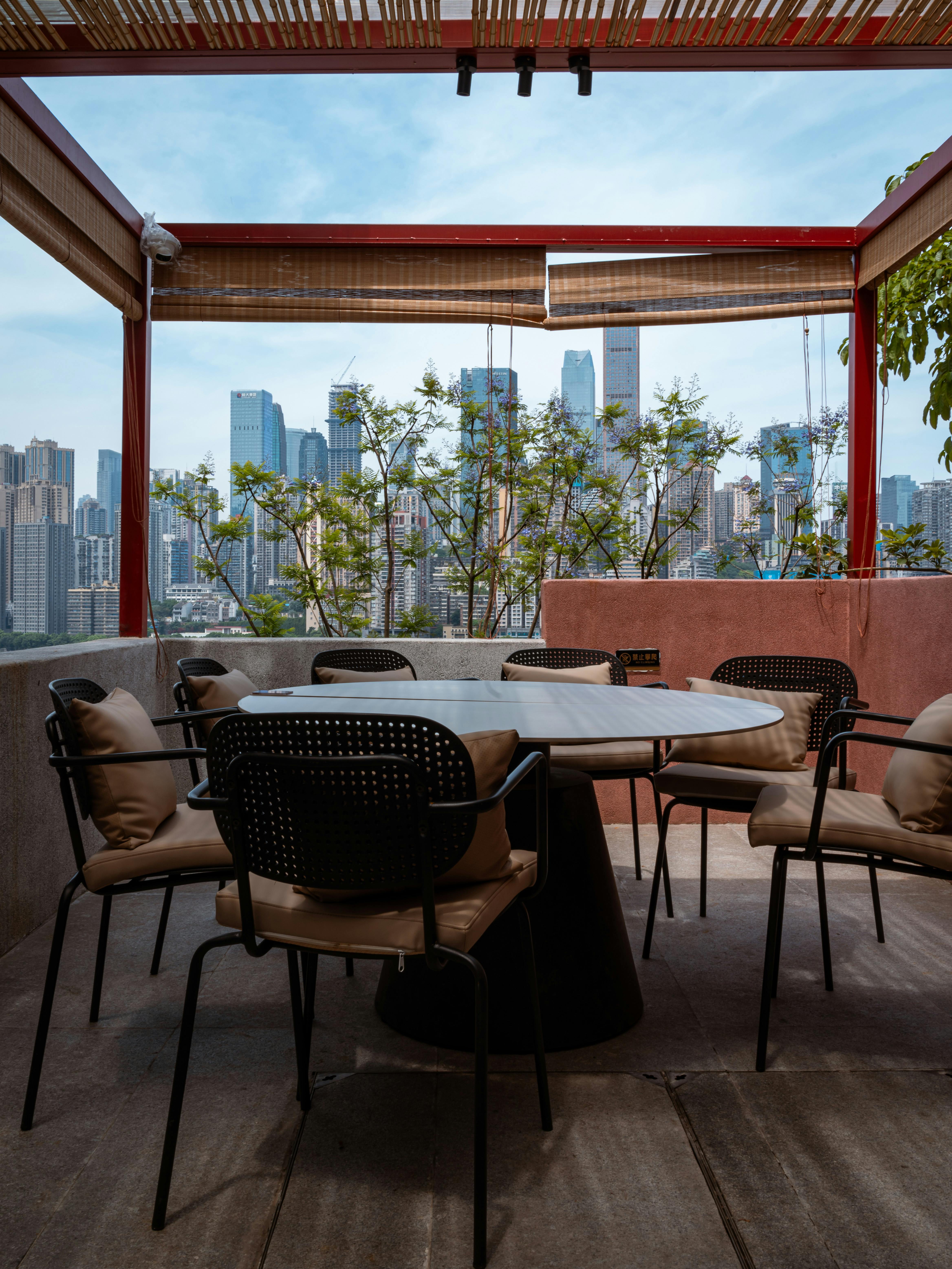 An Alfresco Restaurant on a Building Rooftop · Free Stock Photo