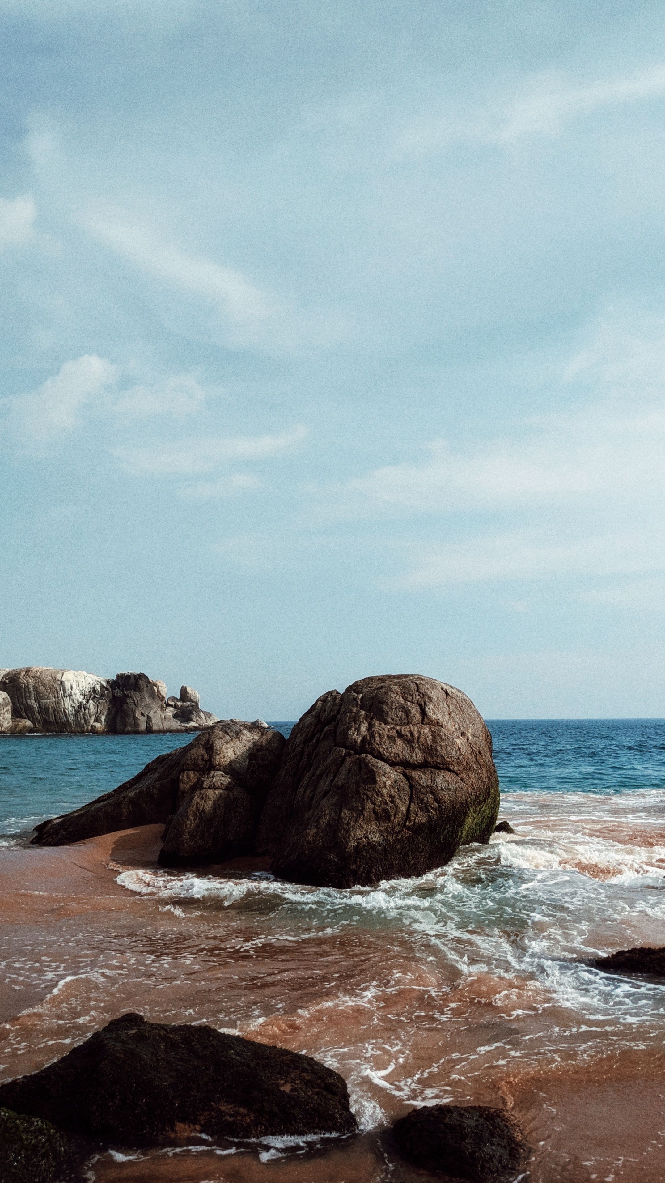 Ocean Washing Rocks on Beach · Free Stock Photo