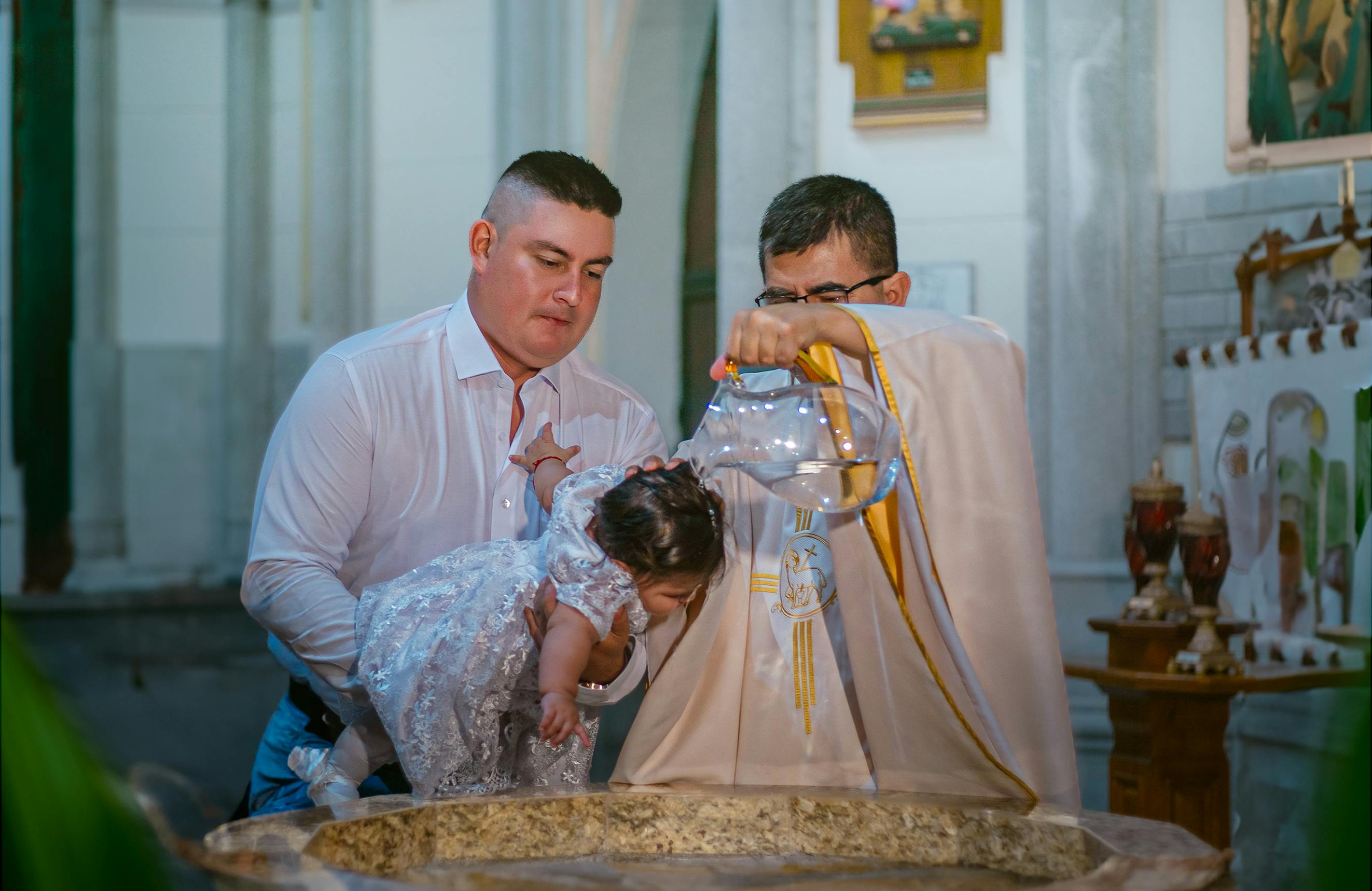 A Child Getting Baptized · Free Stock Photo