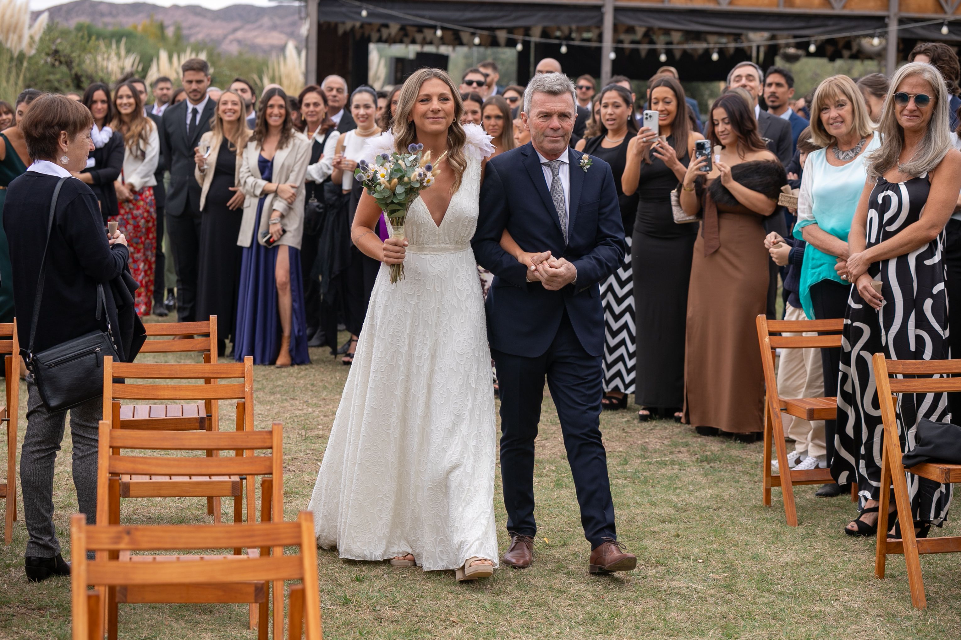 The Bride Walking Down the Aisle with Her Father · Free Stock Photo