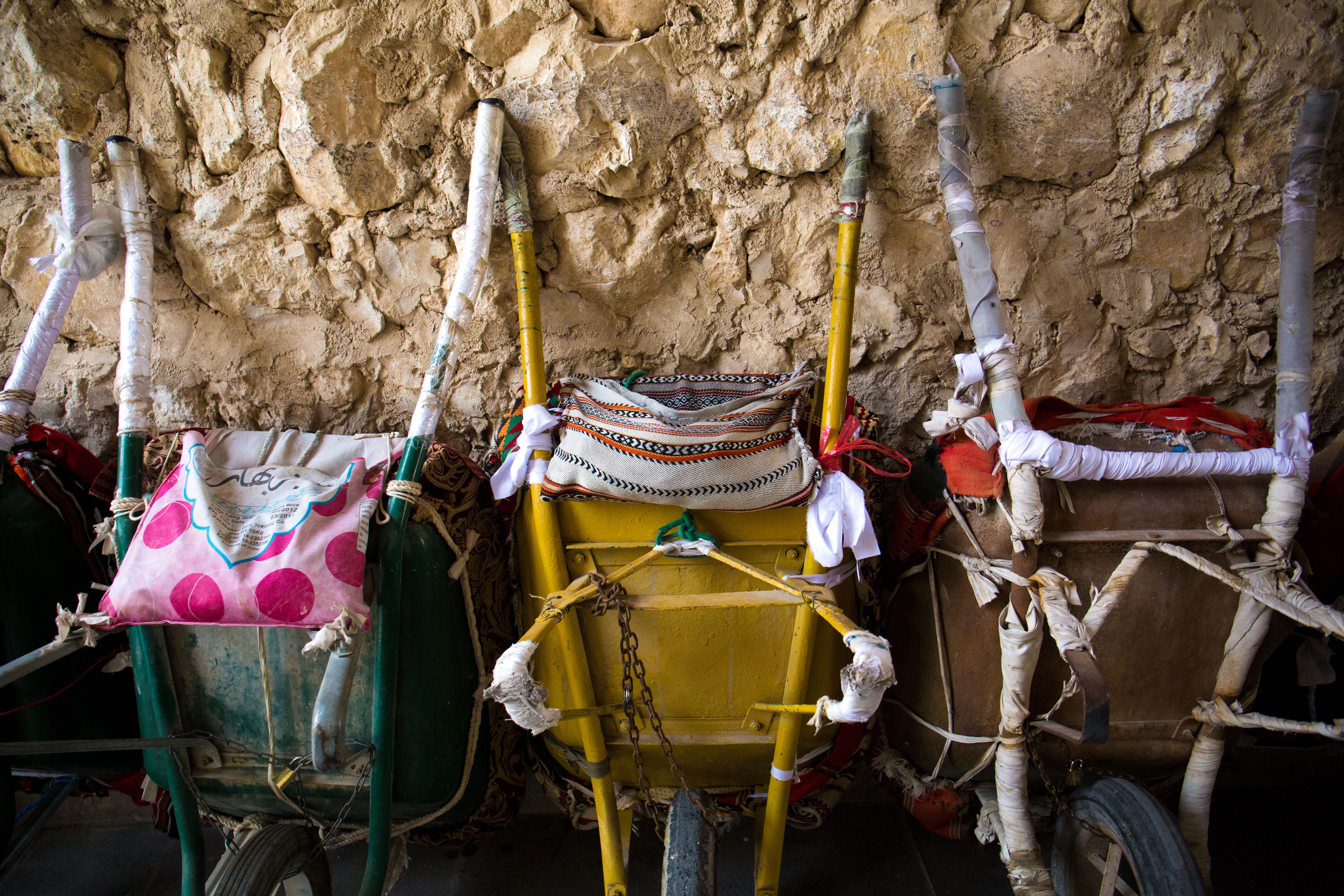 Photo of Green, Yellow, and Brown Wheelbarrows · Free Stock Photo