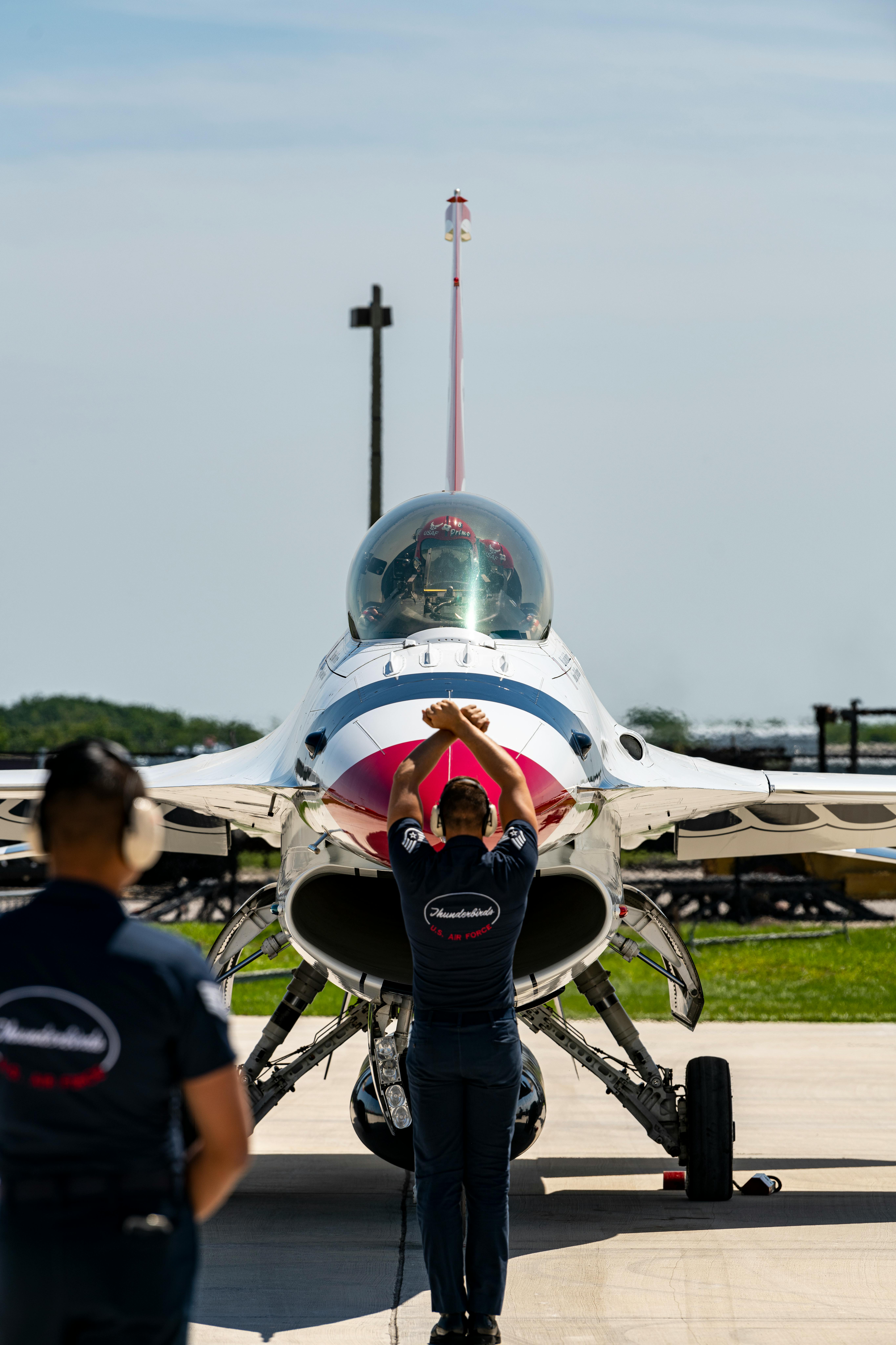 Men Standing in Front of the US Air Force Thunderbirds Aircraft · Free ...