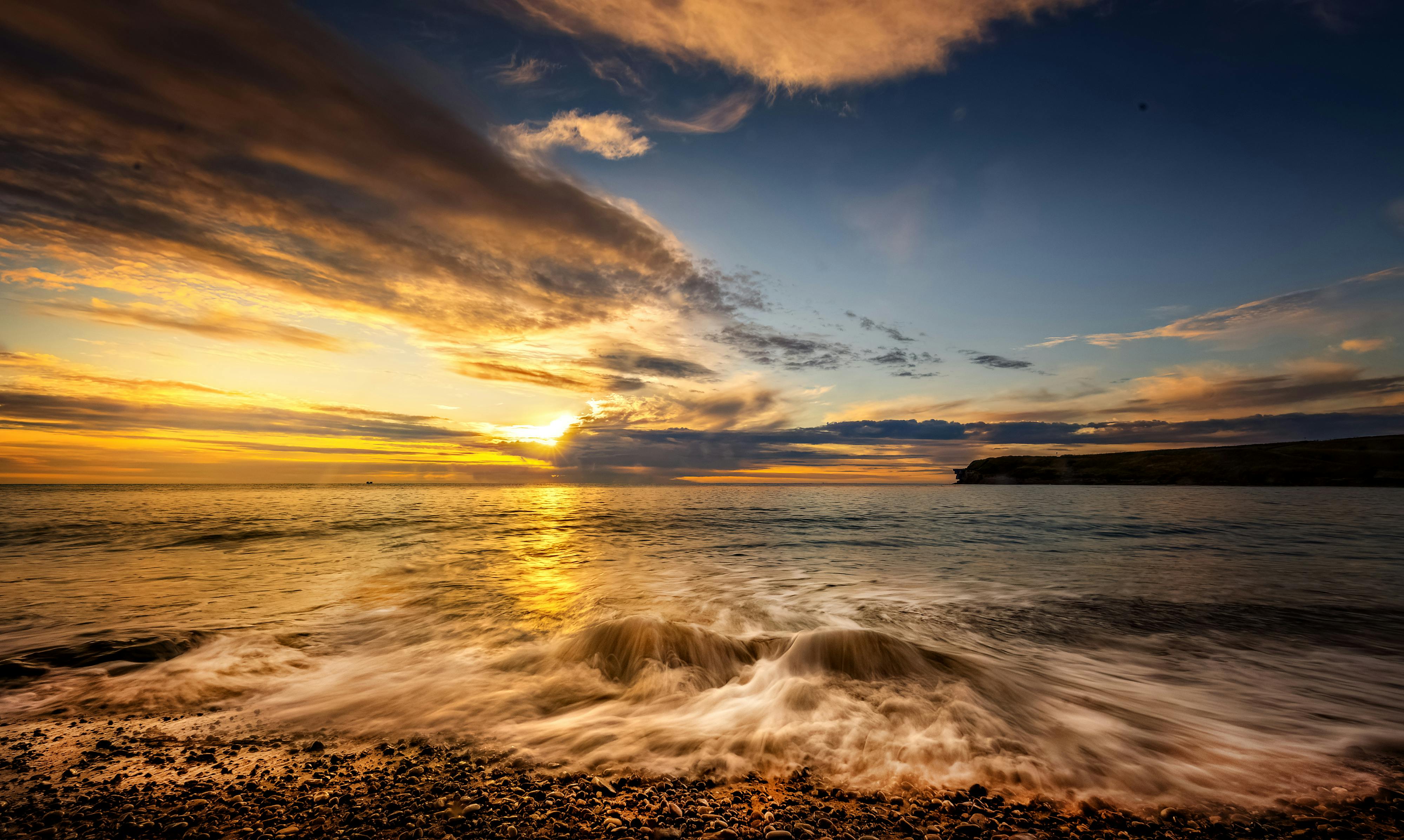 Calm Seashore at Sunset · Free Stock Photo