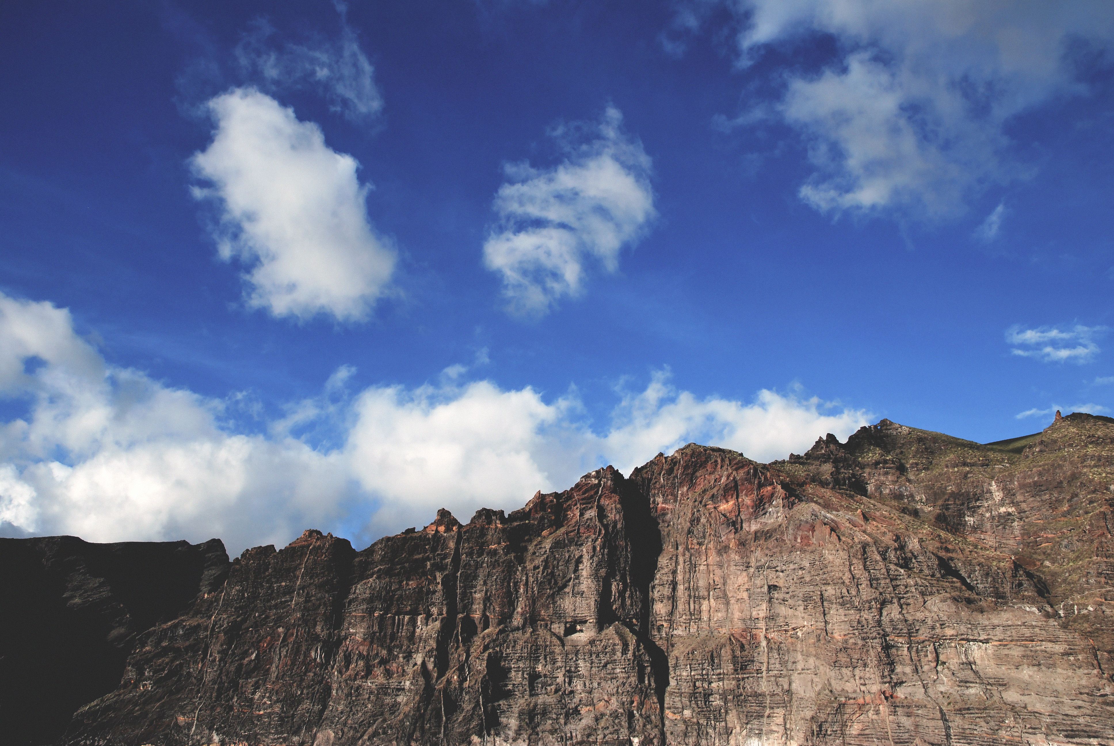 Low-Angle Shot of a Mountain under the Sky · Free Stock Photo