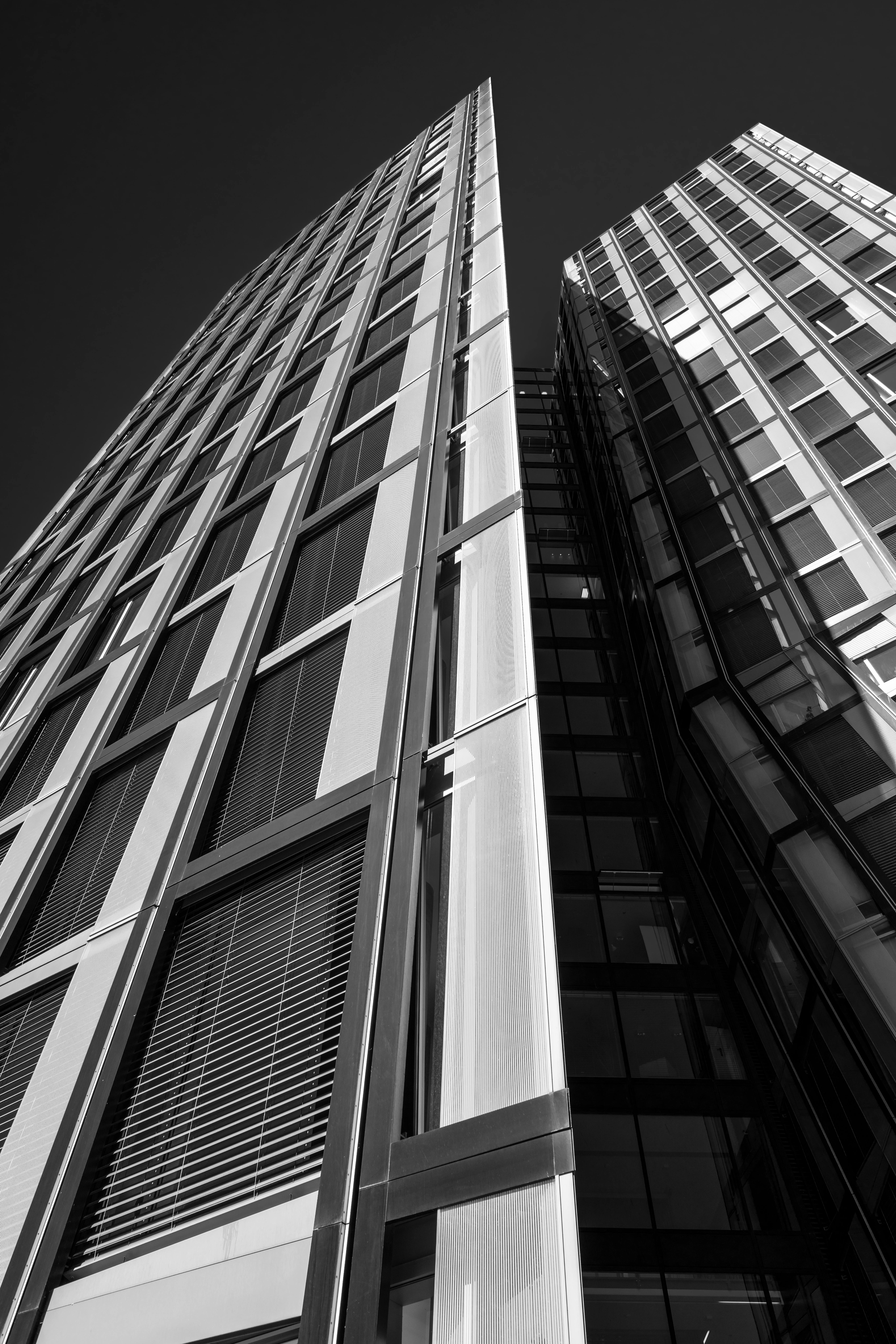 Low Angle Shot of a Modern Skyscraper in a City · Free Stock Photo