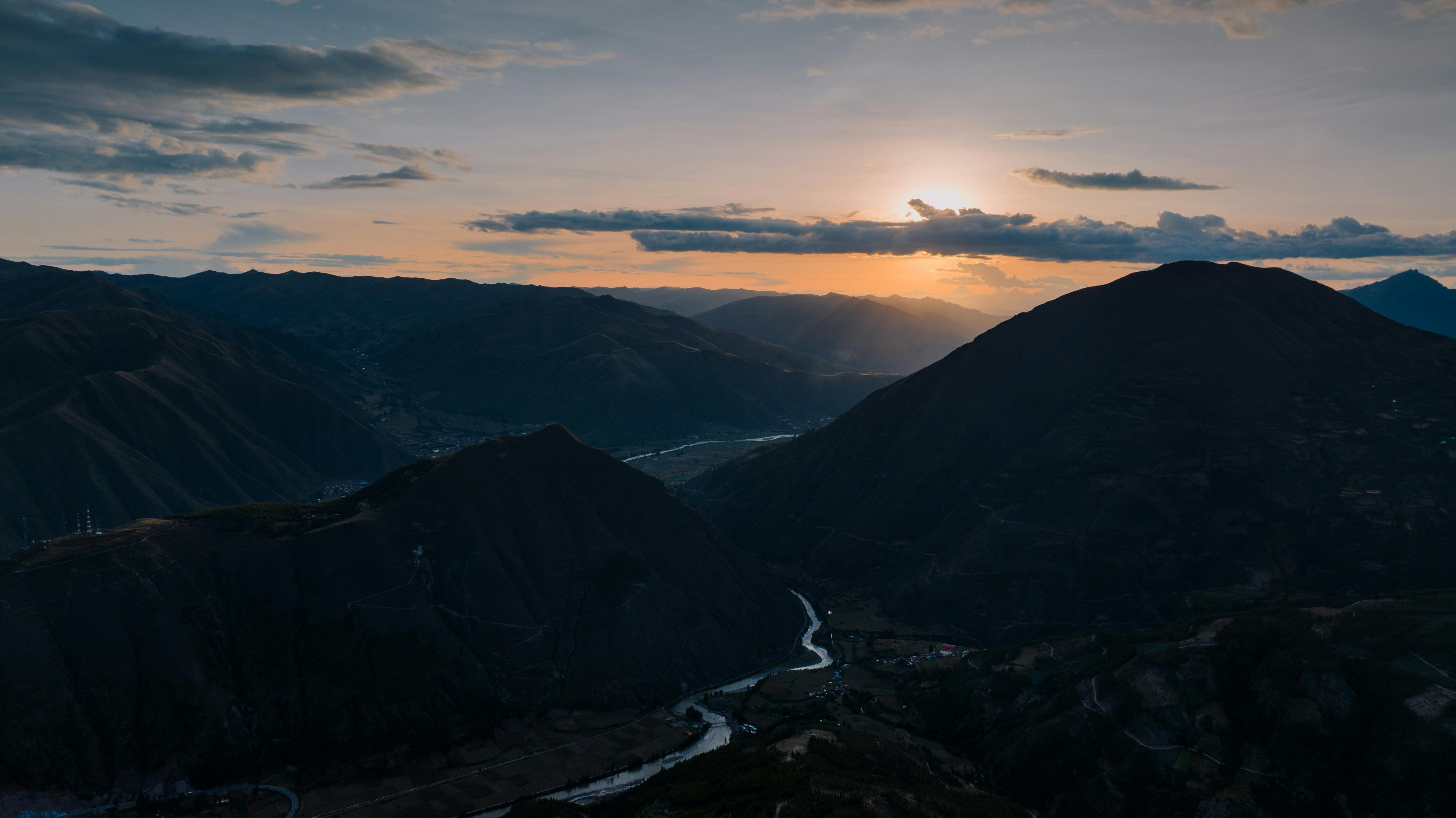 Sun Rising over River Running through Mountain Valley · Free Stock Photo