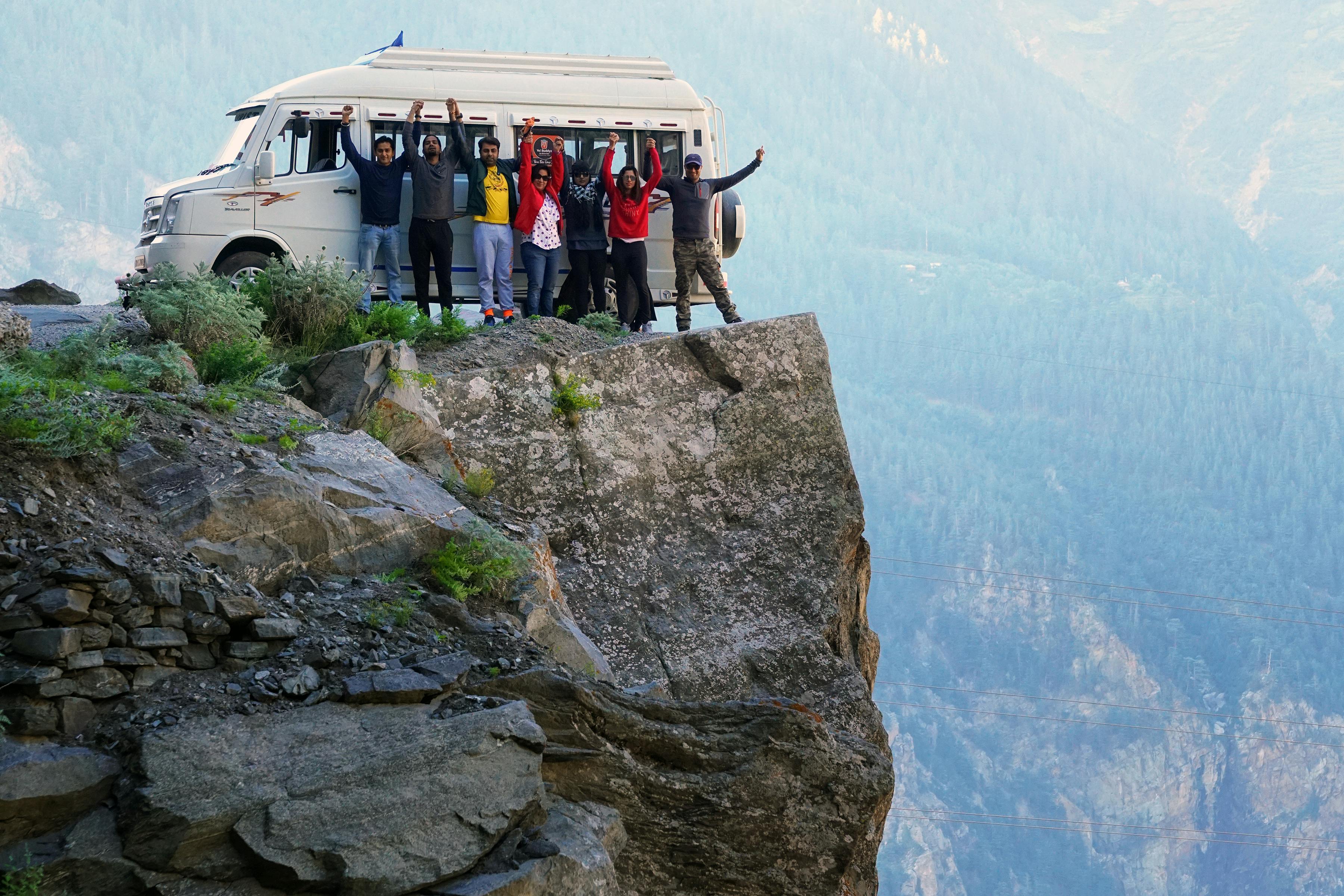 Group of People Standing on A Cliff · Free Stock Photo