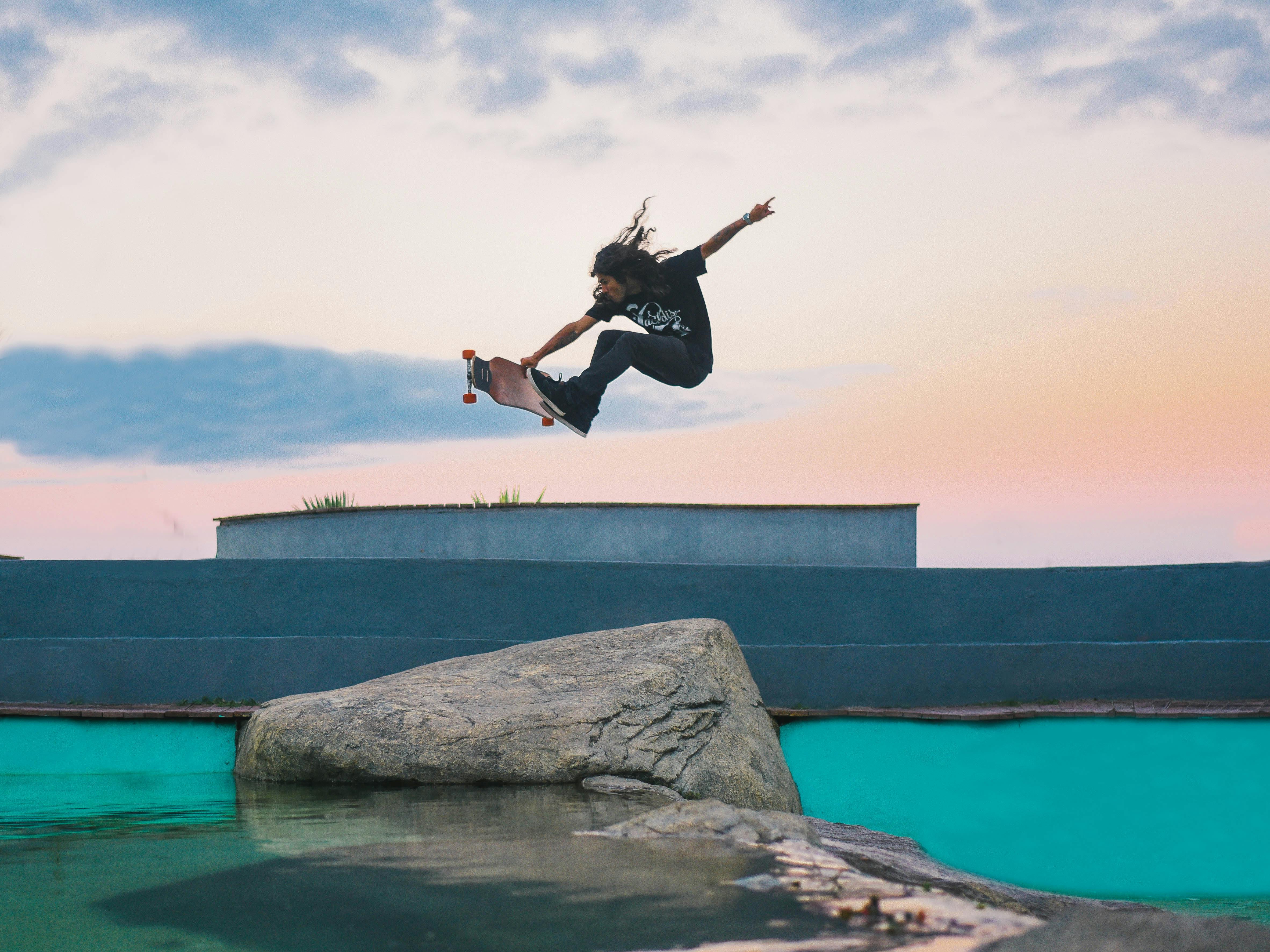 Man In Mid Air With Skateboard · Free Stock Photo