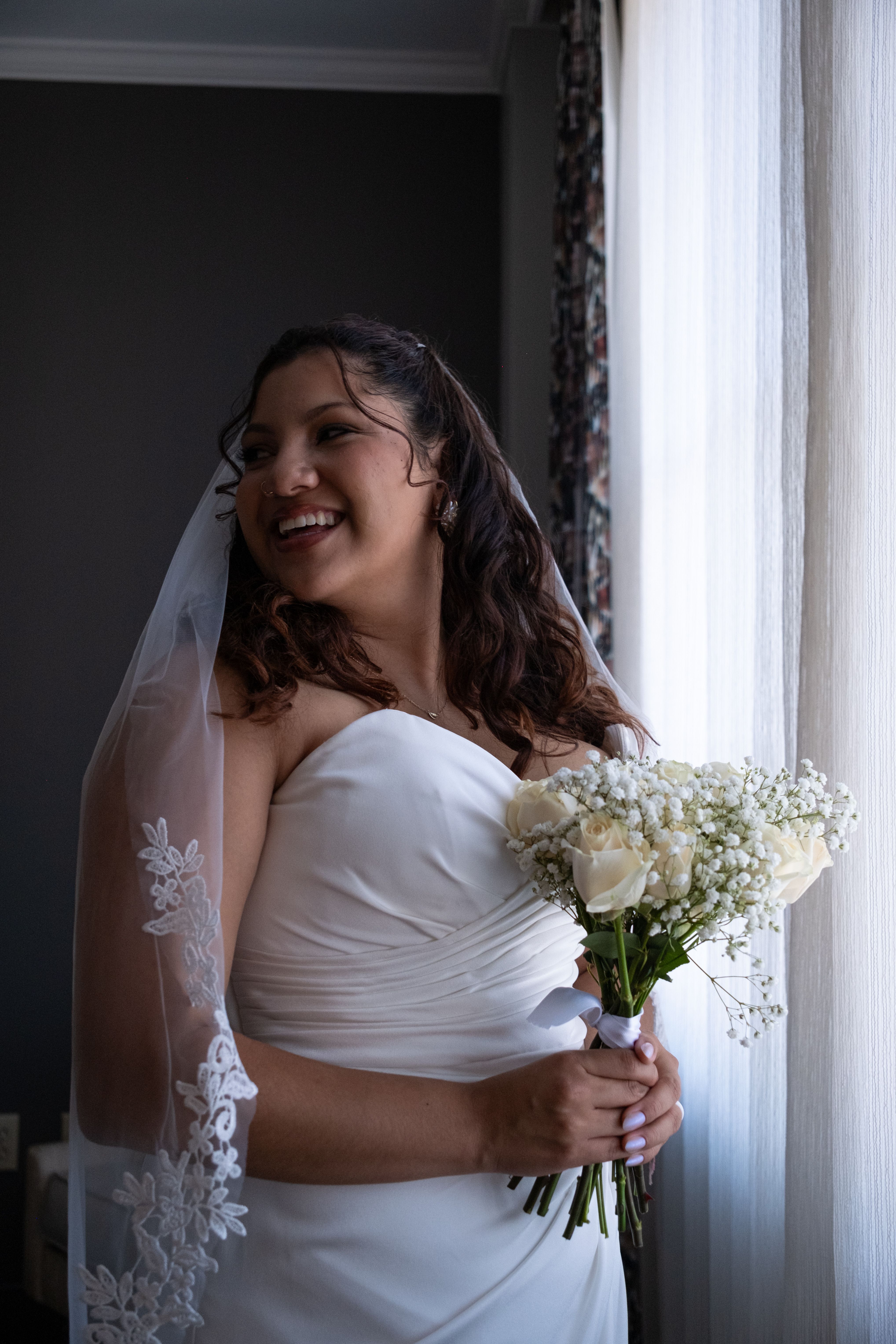 Bride Holding a Bouquet of Flowers · Free Stock Photo