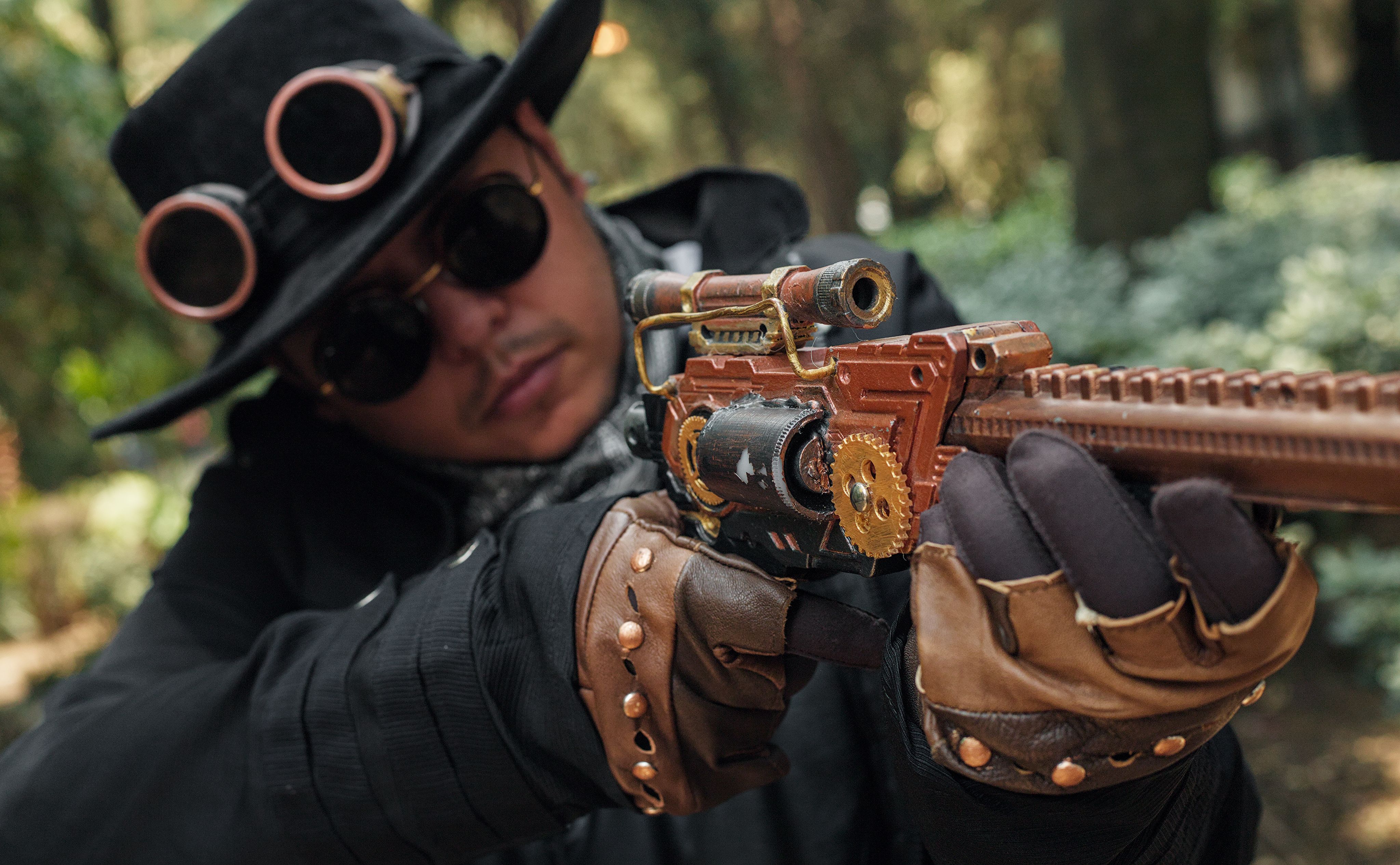 Man Wearing Costume Holding a Gun · Free Stock Photo