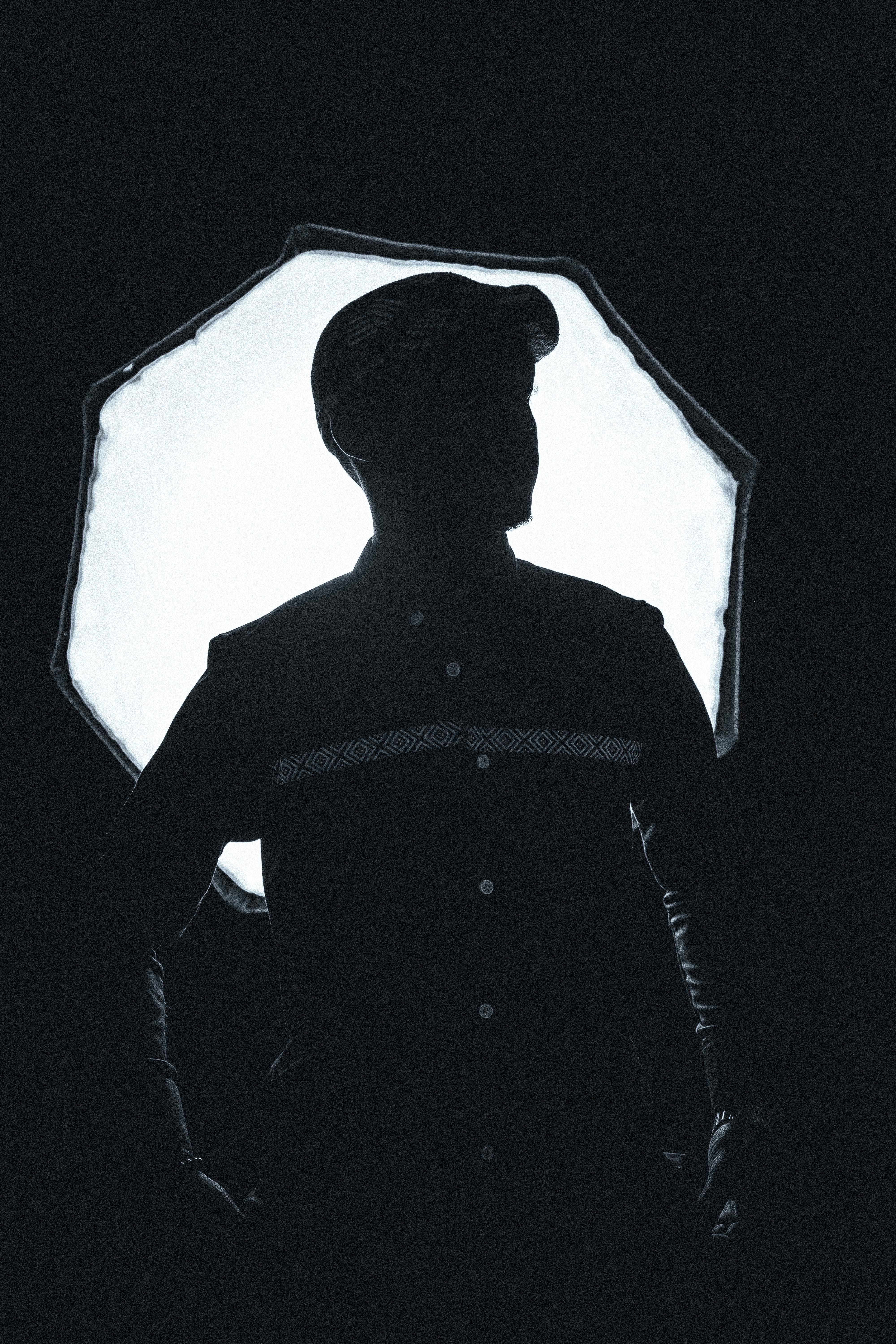 Portrait of African Man in Shadow in Black and White · Free Stock Photo