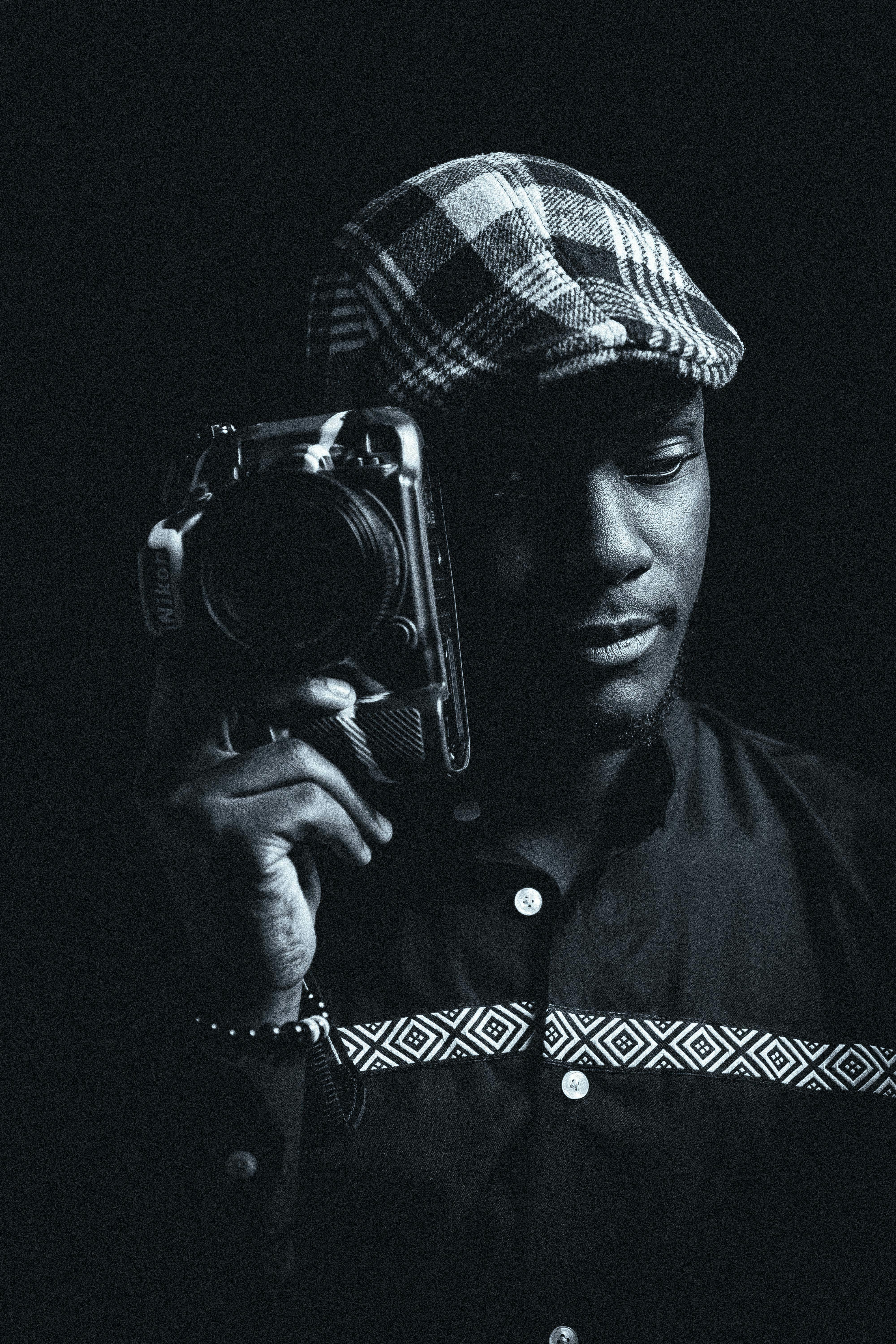 Portrait of African Man in Shadow in Black and White · Free Stock Photo