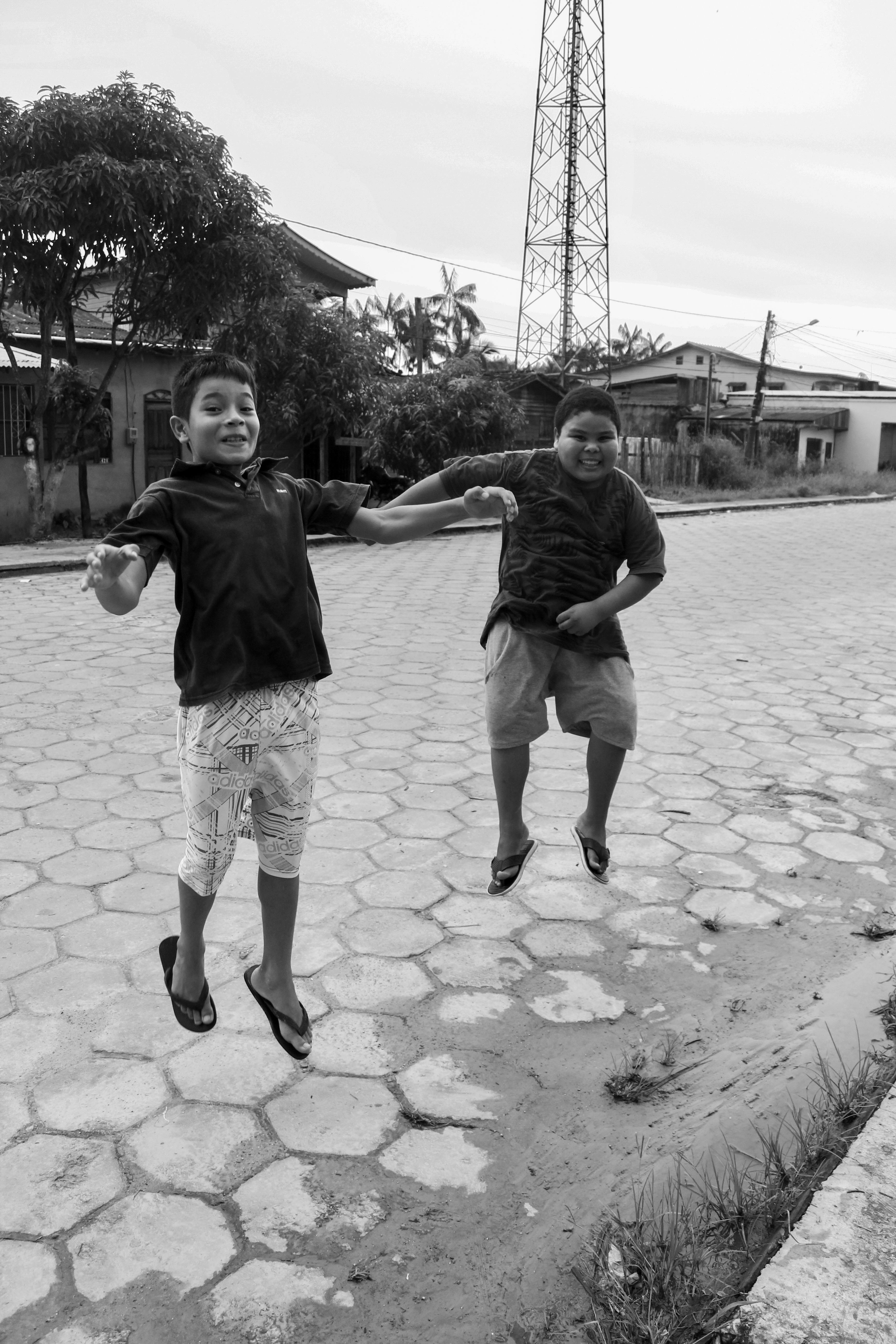 Two Boys Jumping · Free Stock Photo