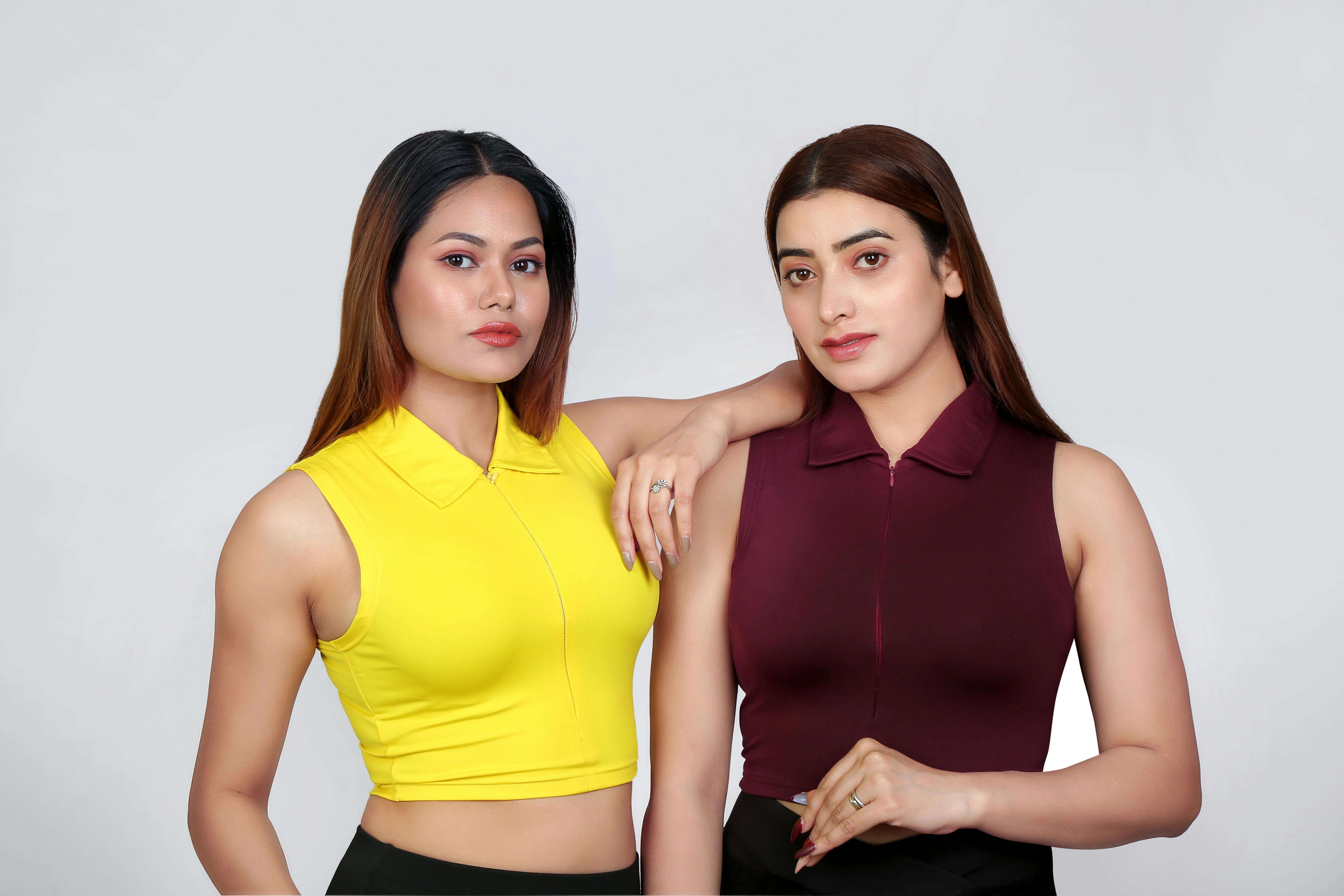 Two Women in Crop Tops · Free Stock Photo