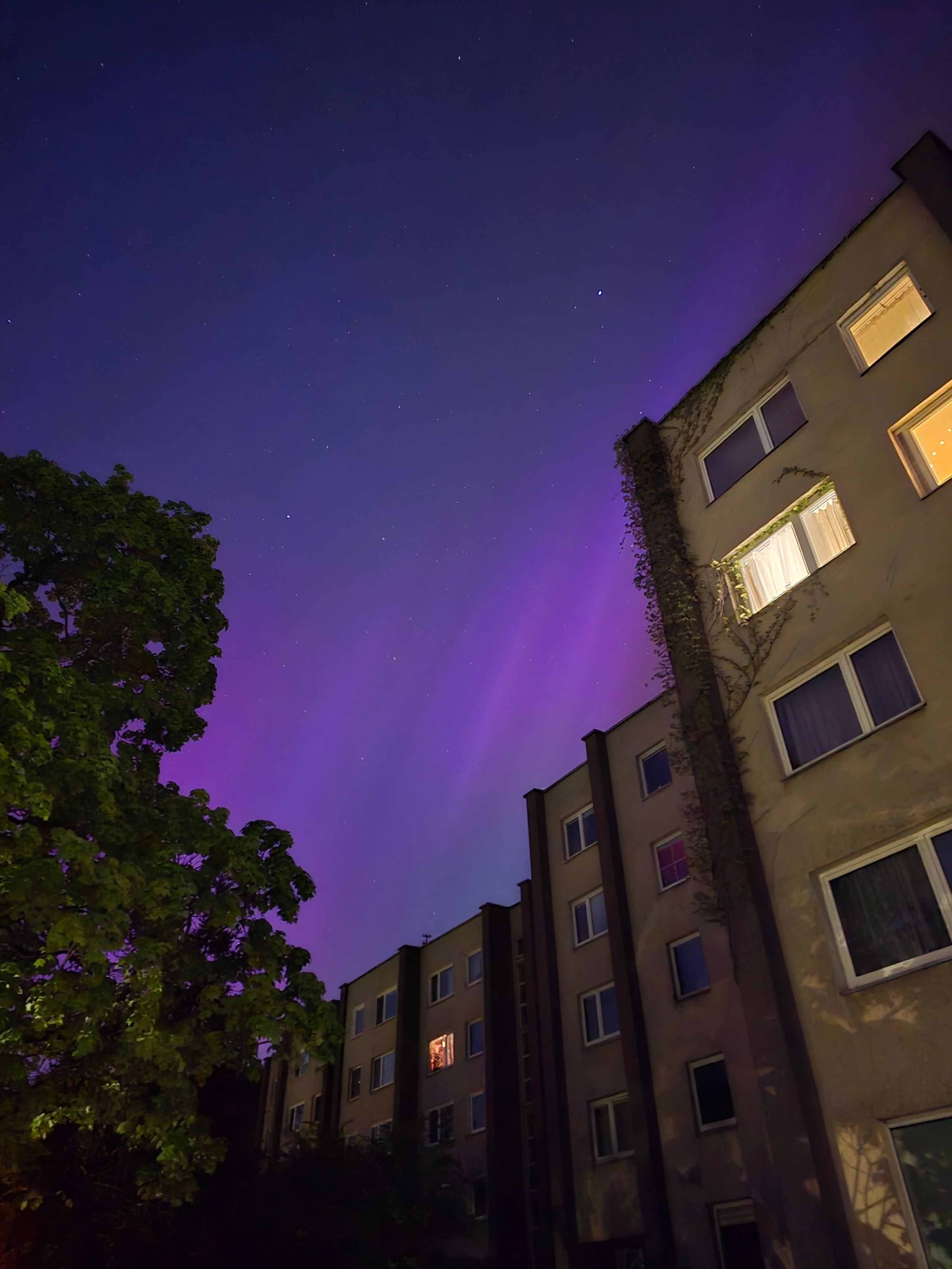 Night Sky over the Residential Buildings in a City · Free Stock Photo