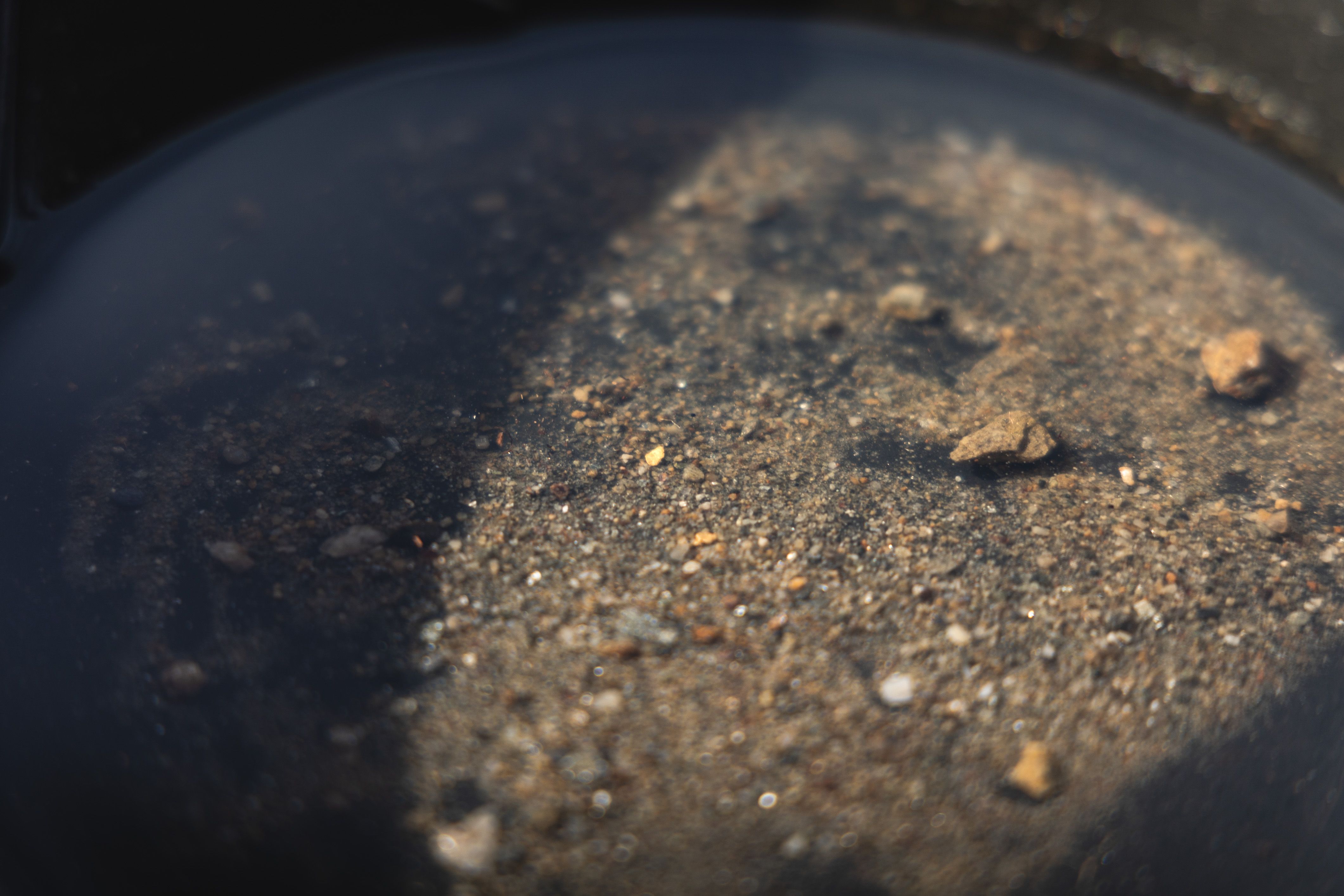 Close-up of a Groung With Small Rocks and Sand · Free Stock Photo