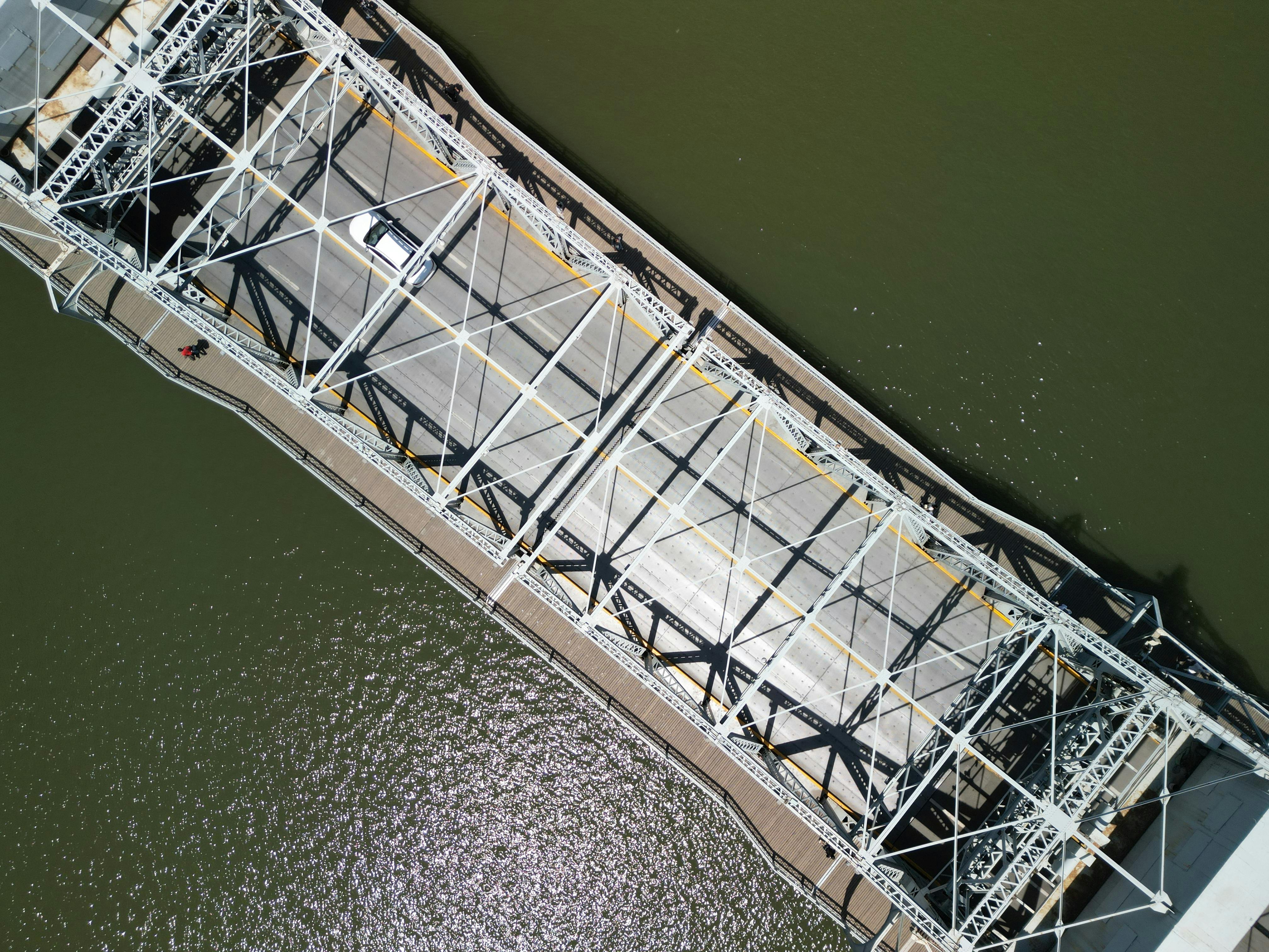 Asphalt Bridge over River in Birds Eye View · Free Stock Photo