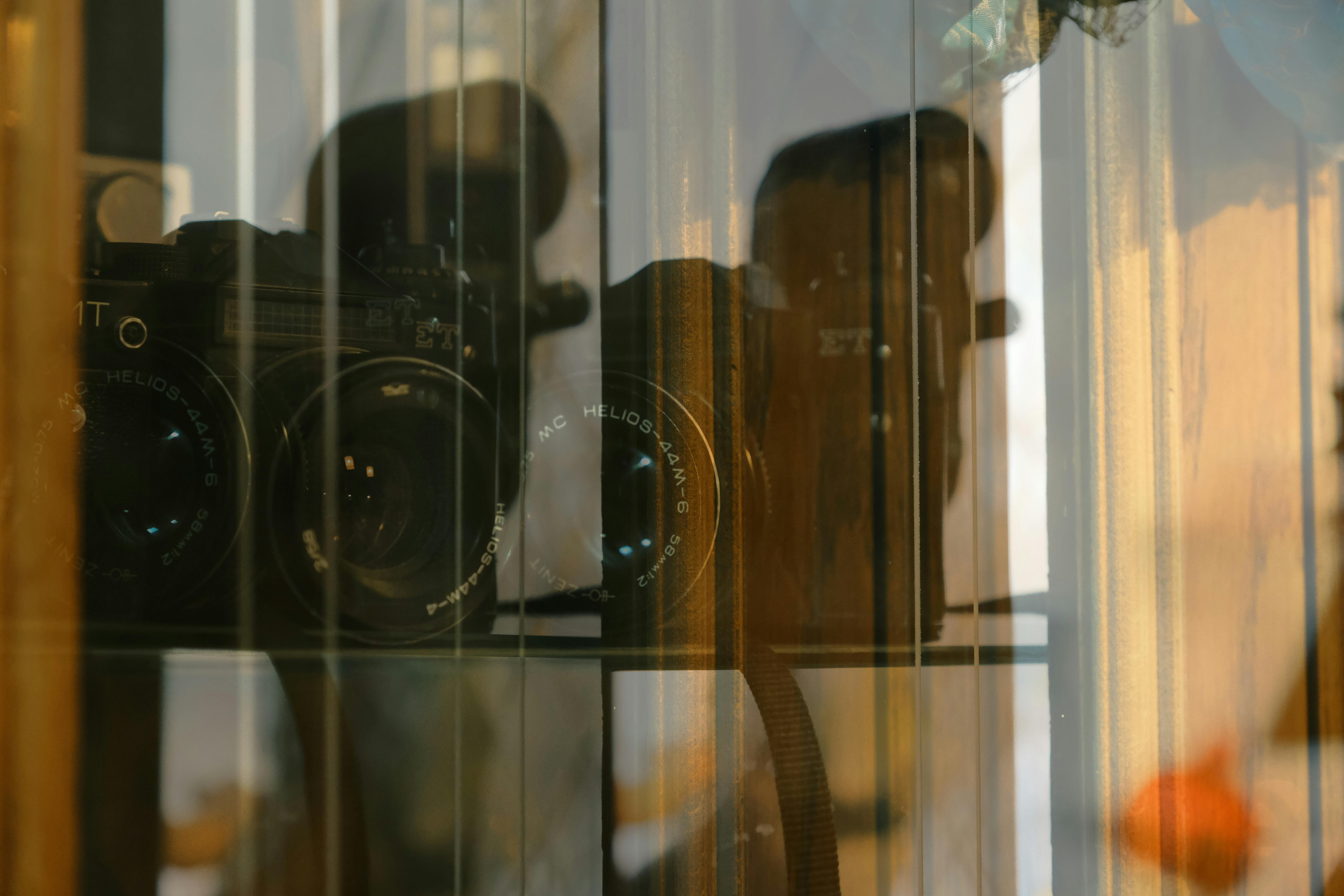 Analog Camera and its Reflections in the Display Case Glass · Free ...