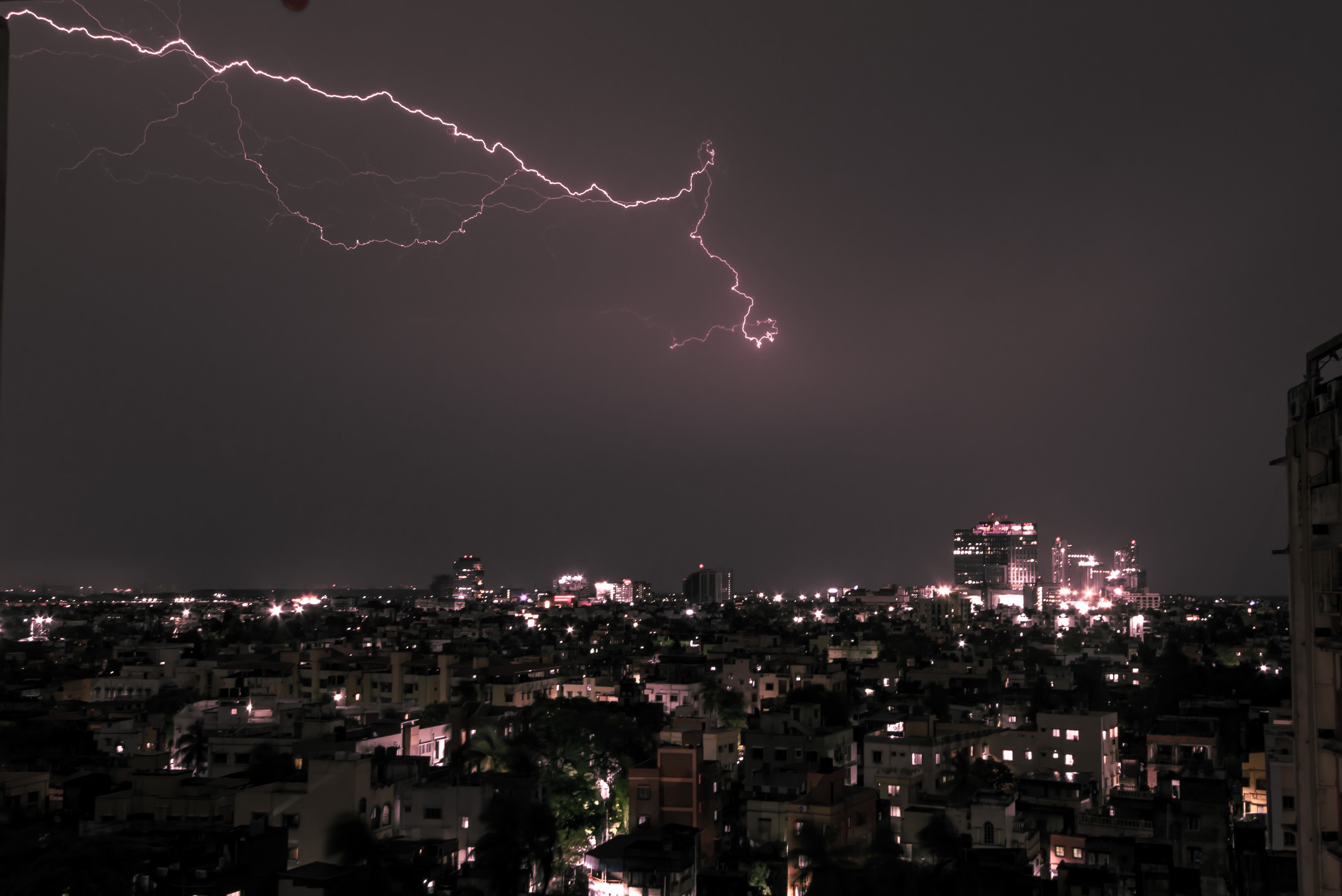 Long Lightning Strike Caught on Camera over City · Free Stock Photo