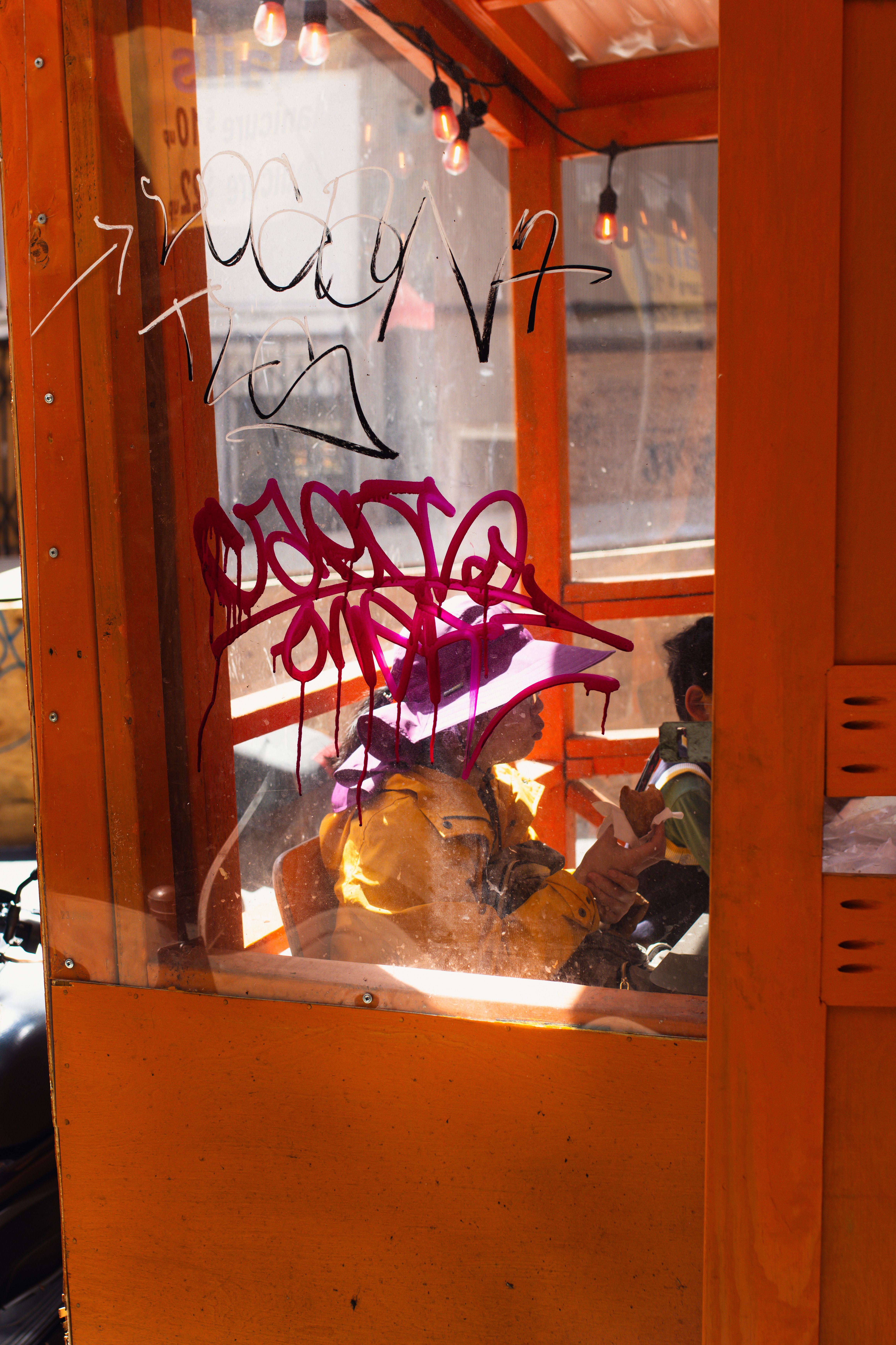 Outdoors Sitting Booth of Restaurant with Graffiti on Glass · Free ...