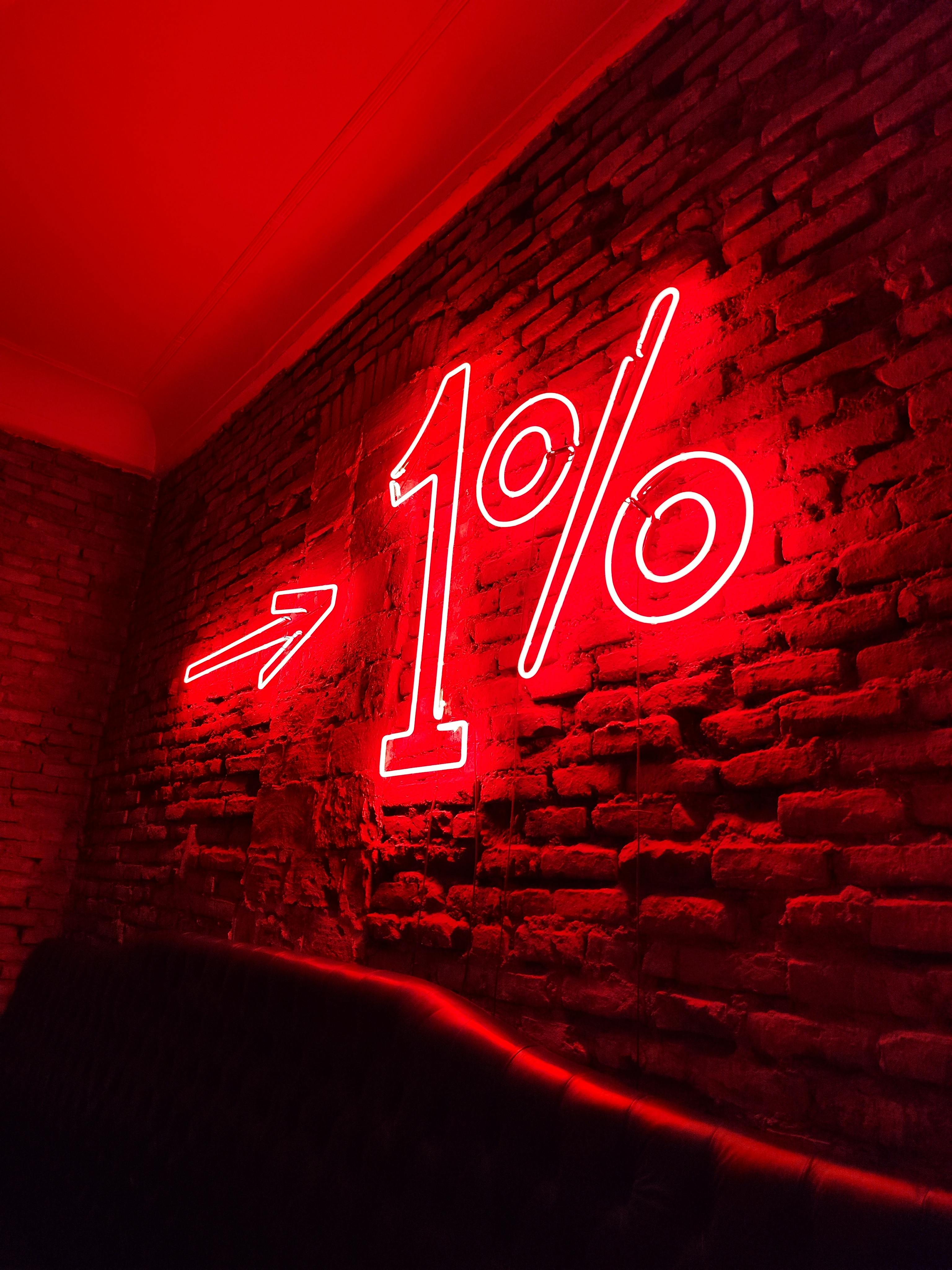 Neon Sign on a Brick Wall · Free Stock Photo
