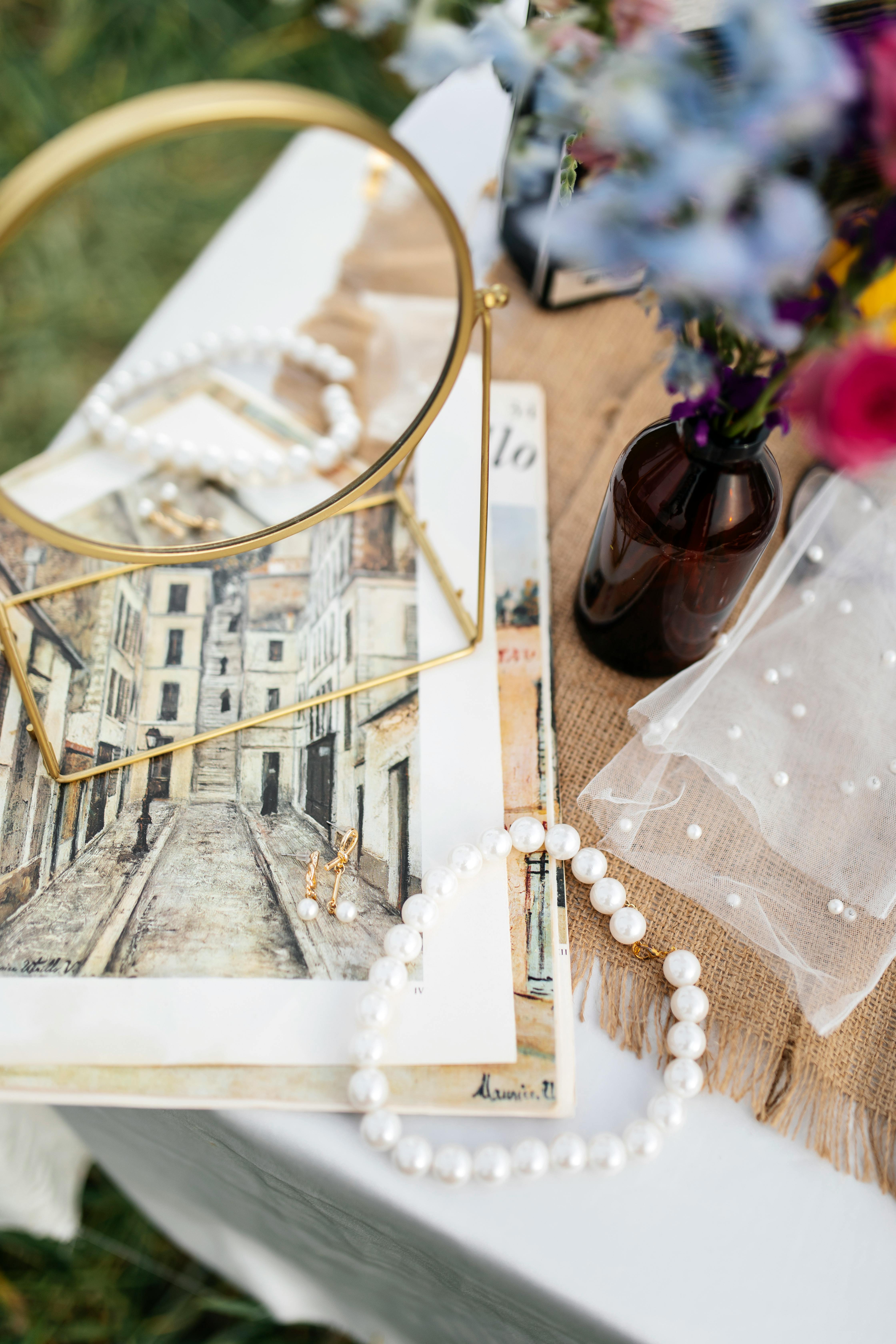 Mirror on Book Page · Free Stock Photo