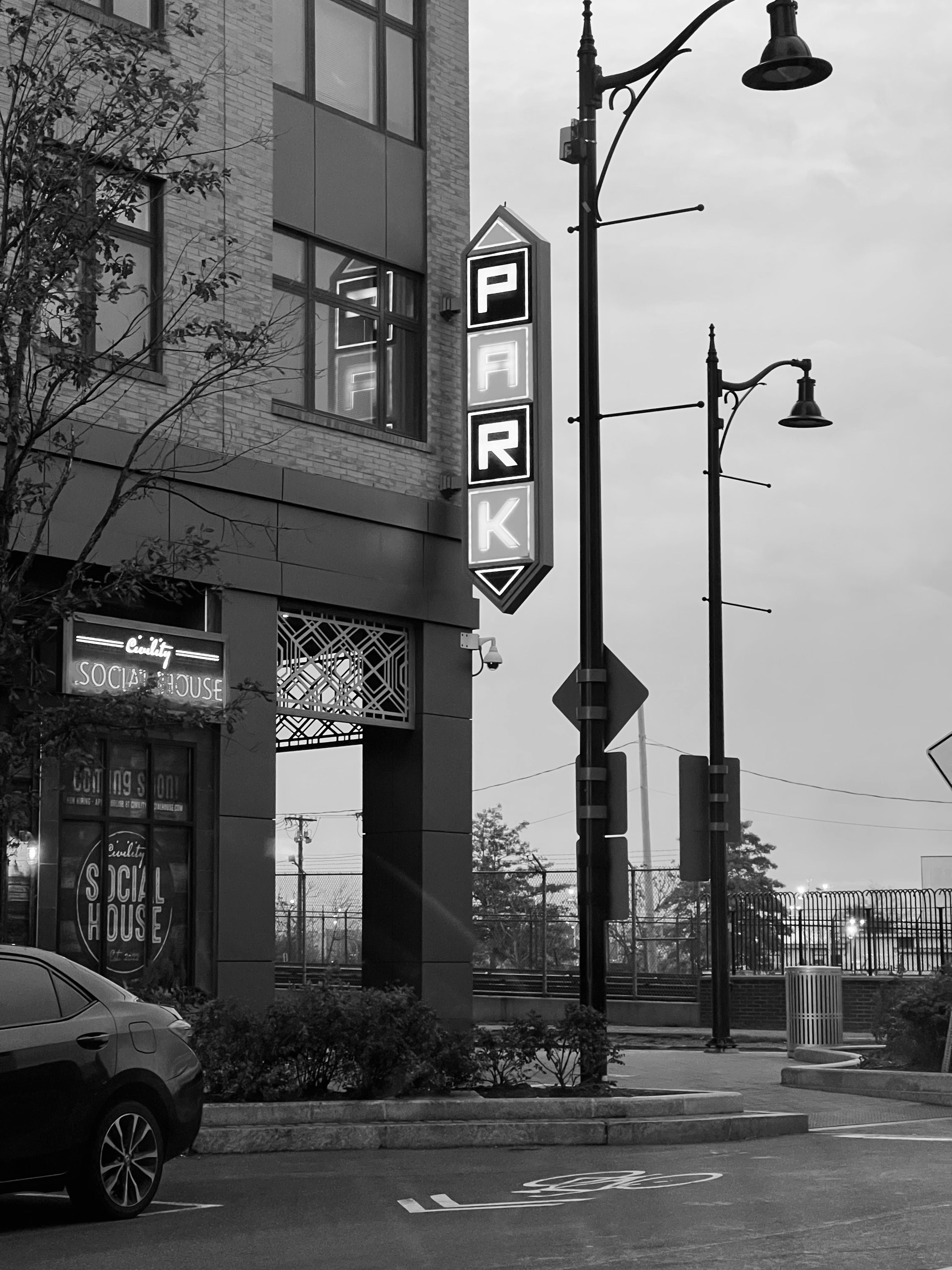Parking Garage Sign on the Corner of the Building · Free Stock Photo