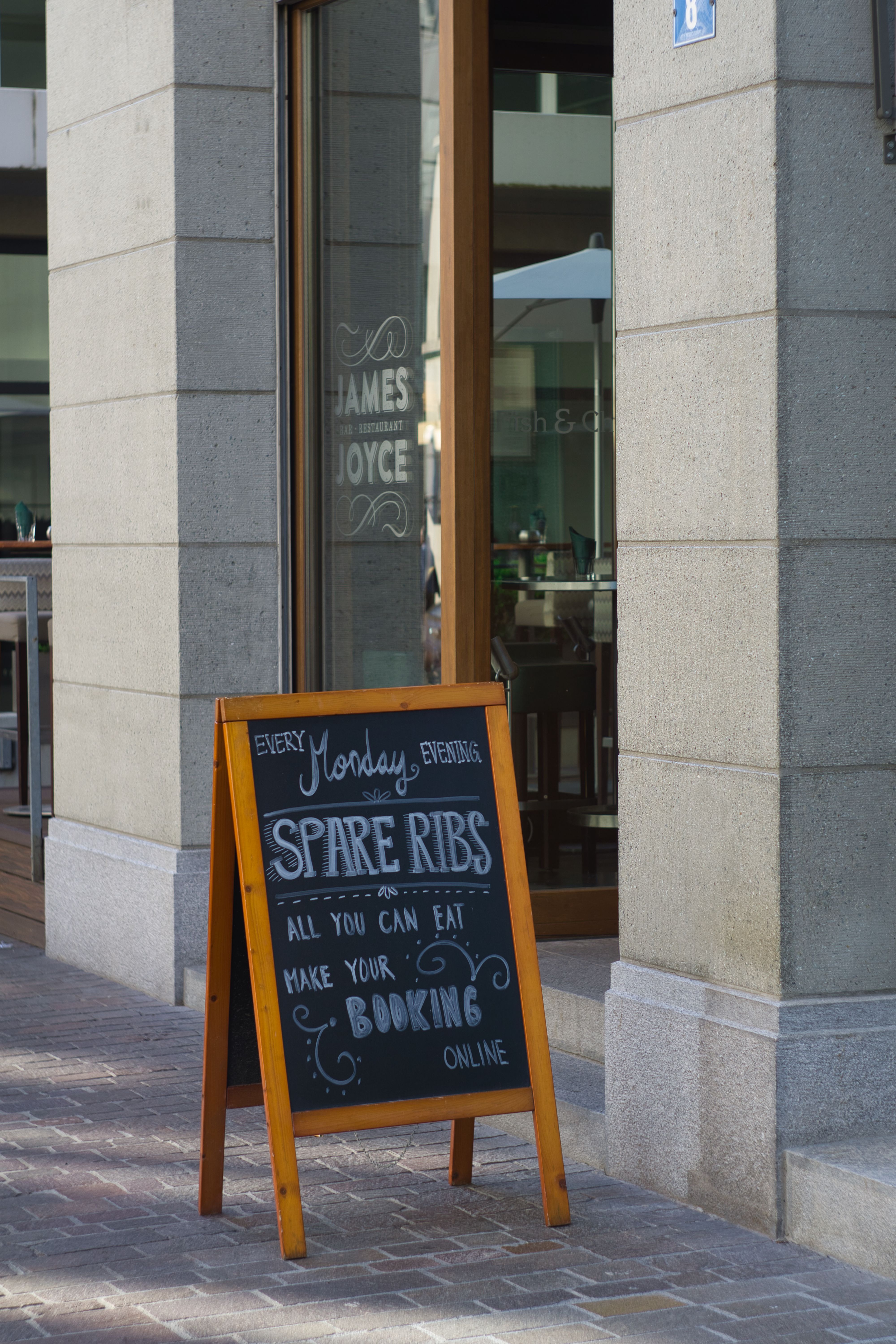Sign in front of a Restaurant · Free Stock Photo