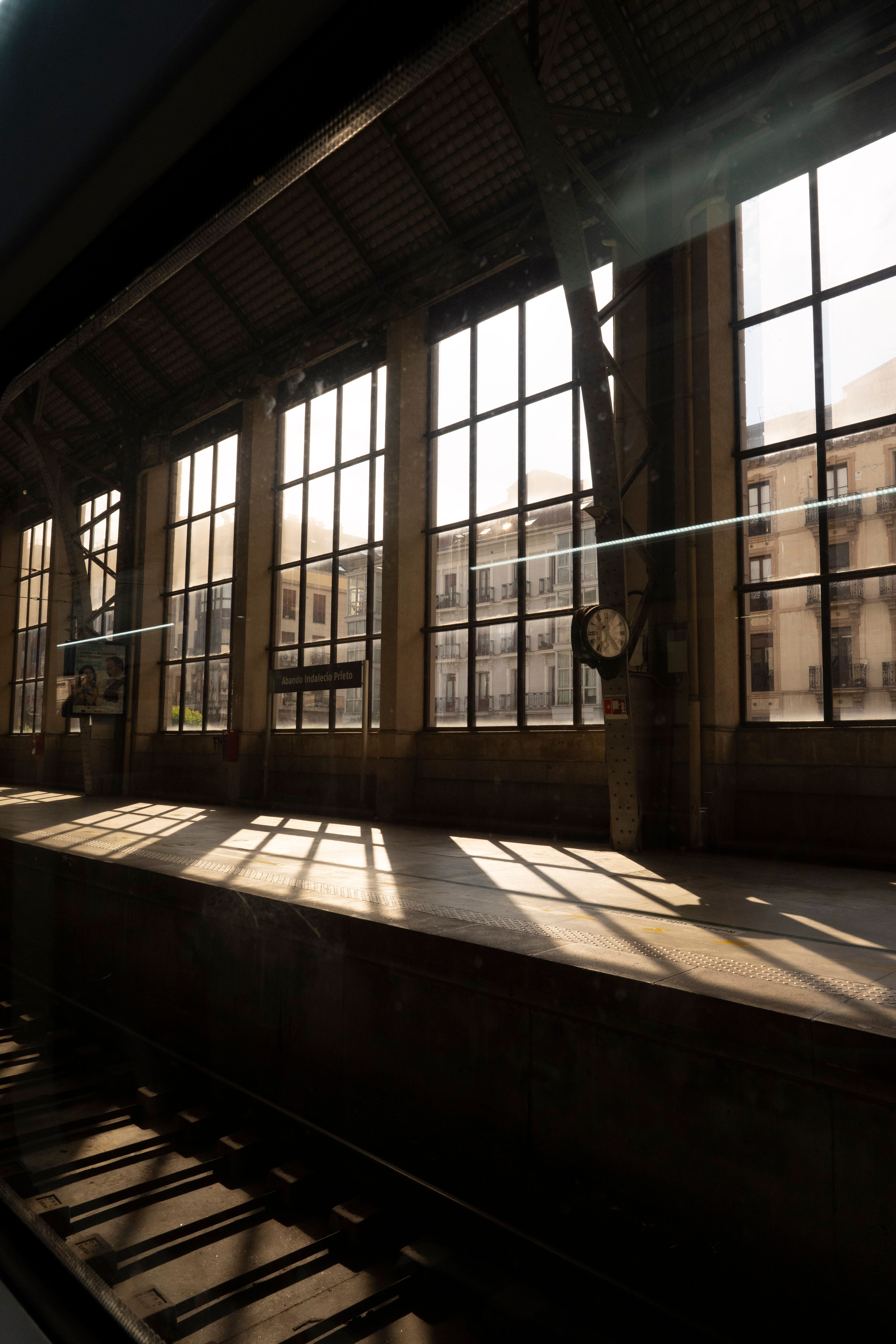 A train station with windows and sunlight · Free Stock Photo