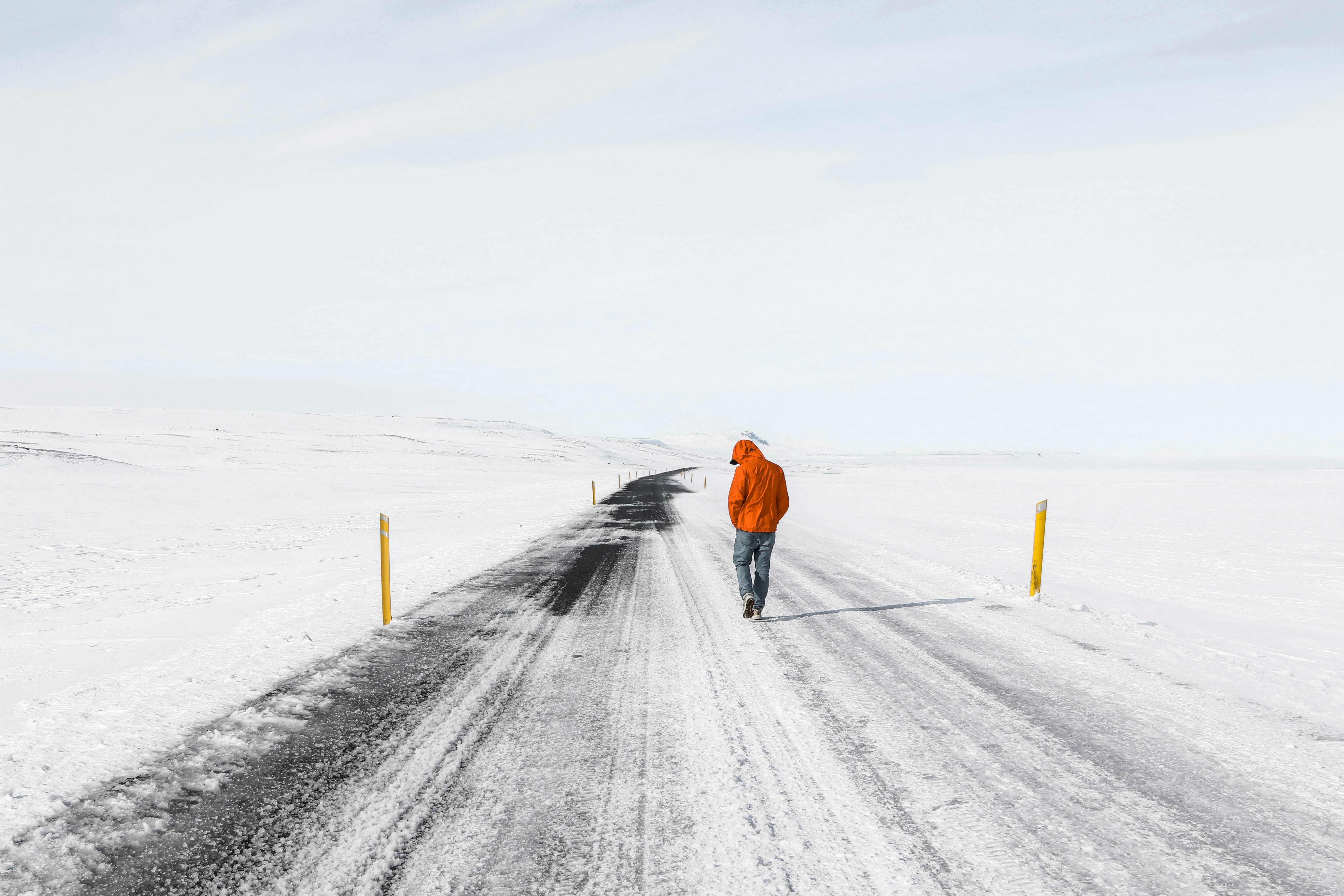 Person Standing on Highway · Free Stock Photo
