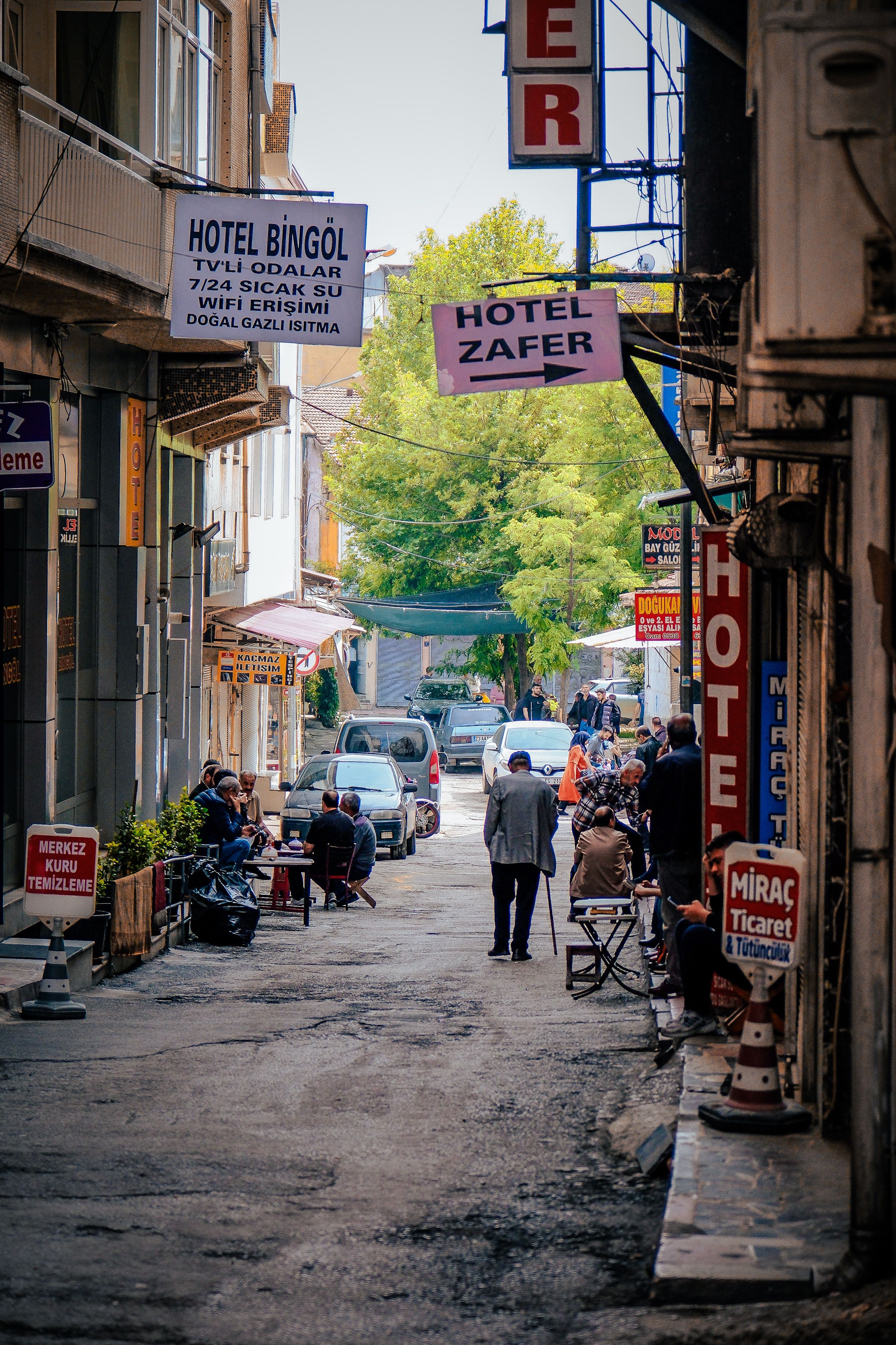 View of a Narrow Alley with Signs on the Buildings · Free Stock Photo