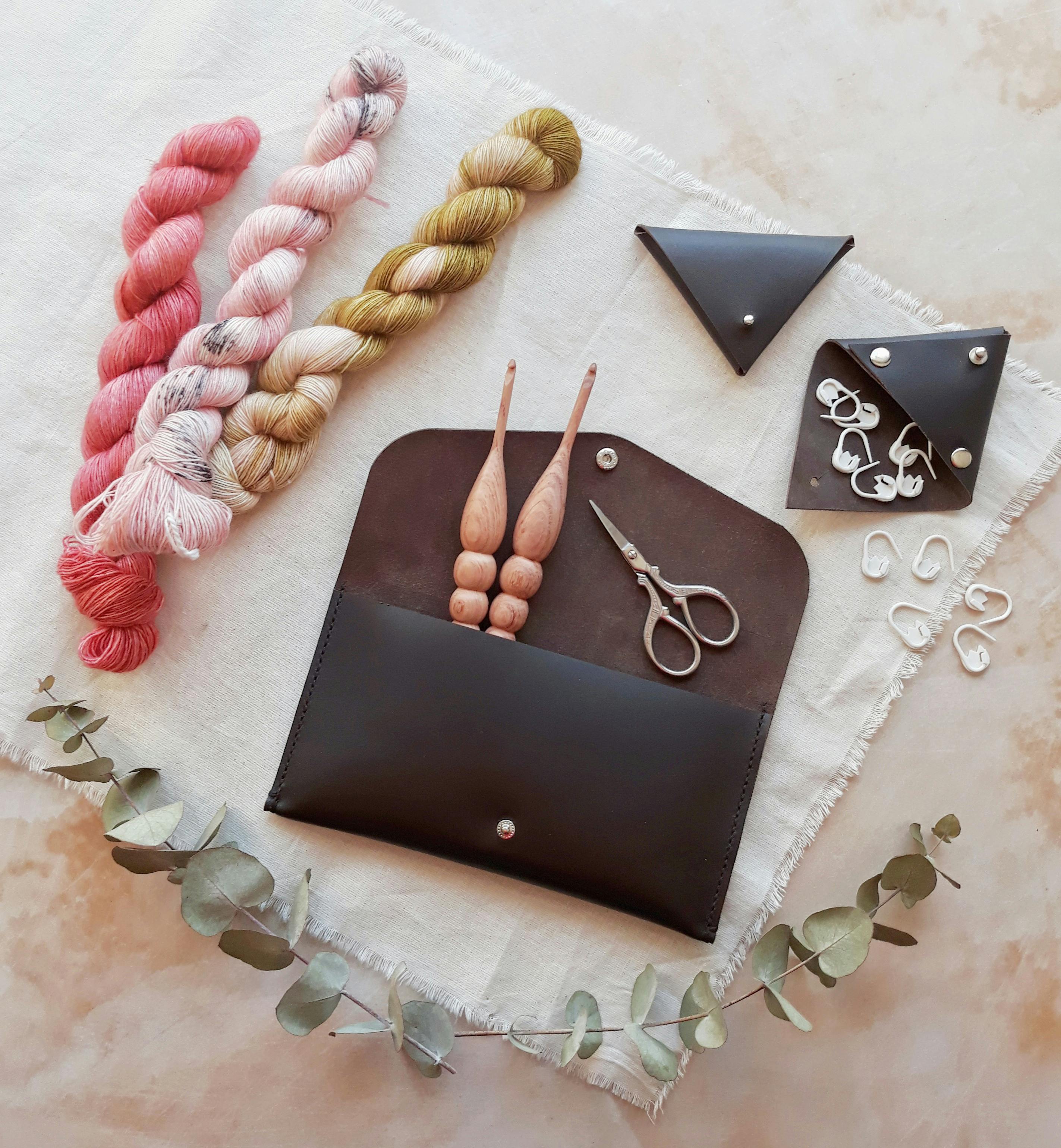 Three Assorted-color Ropes on White Textile · Free Stock Photo