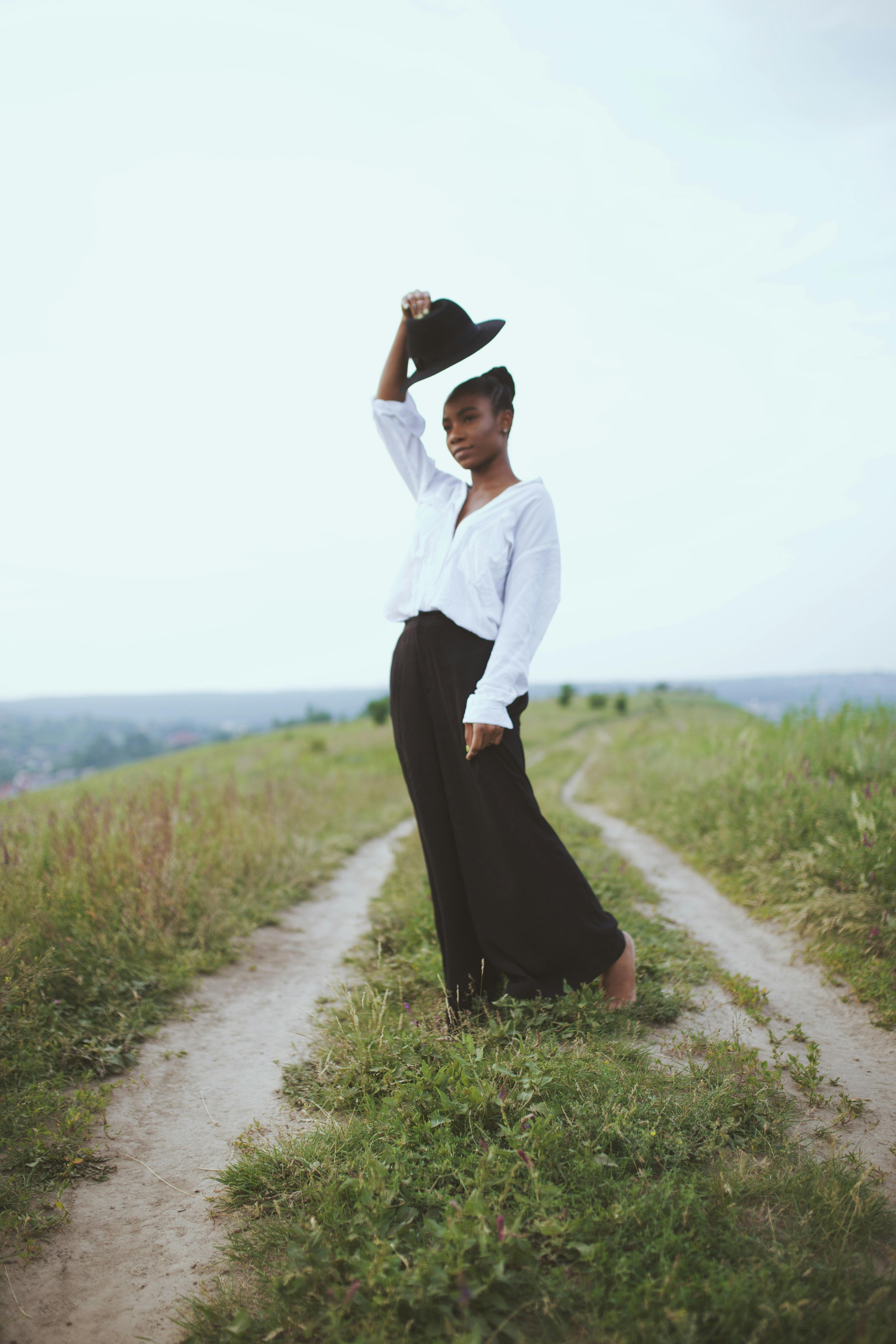 Woman Standing in Sunlight · Free Stock Photo