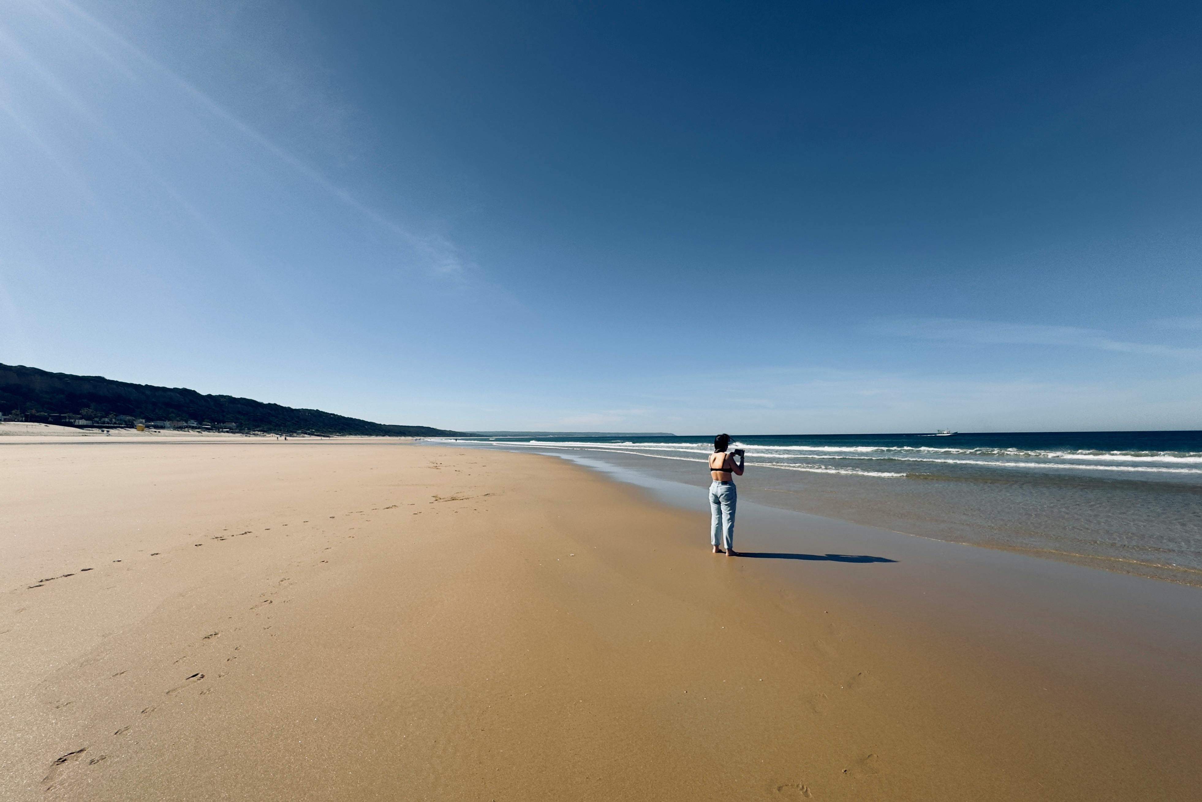 Woman Filming the Ocean · Free Stock Photo