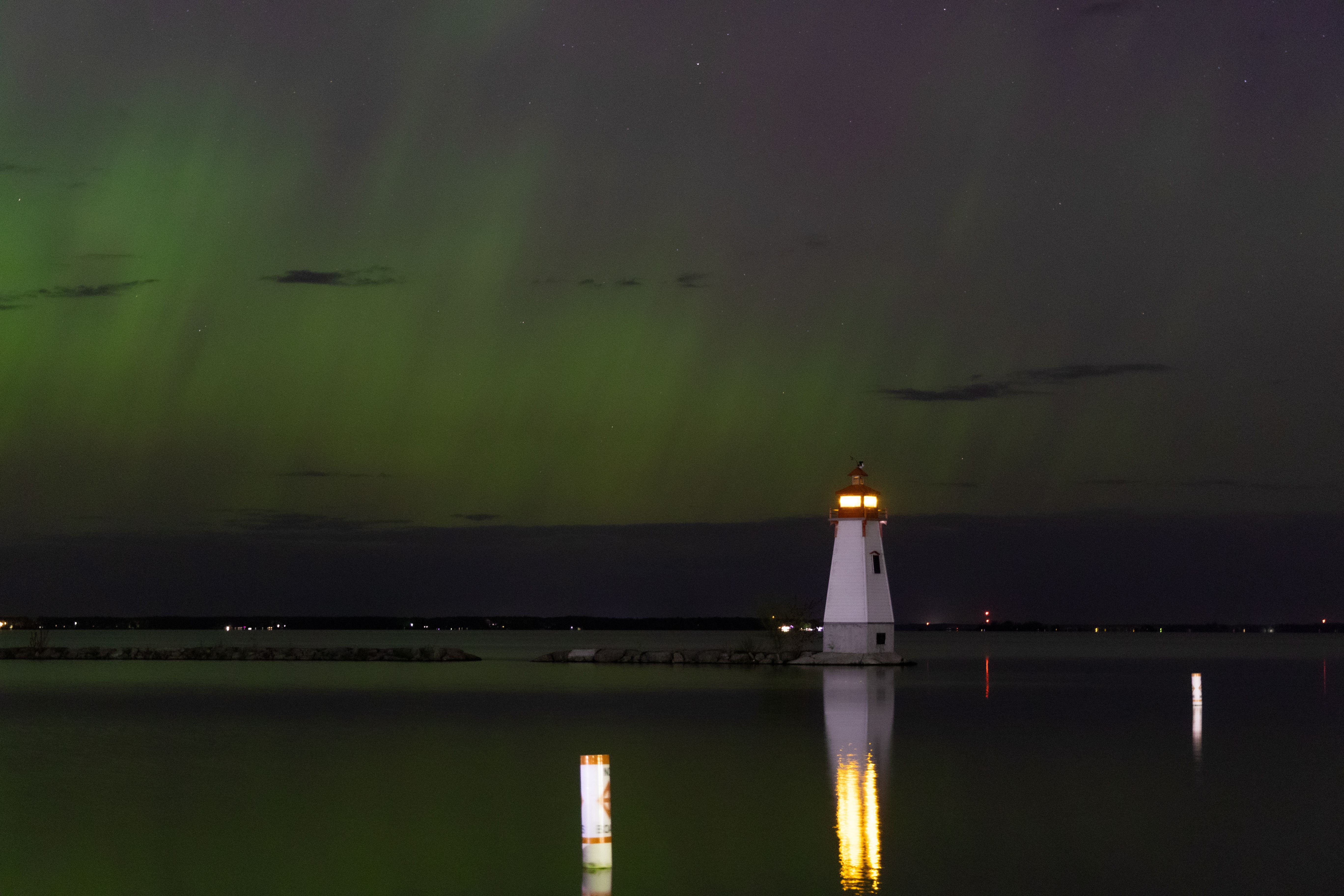 Aurora Borealis over Ligthouse on Lake · Free Stock Photo